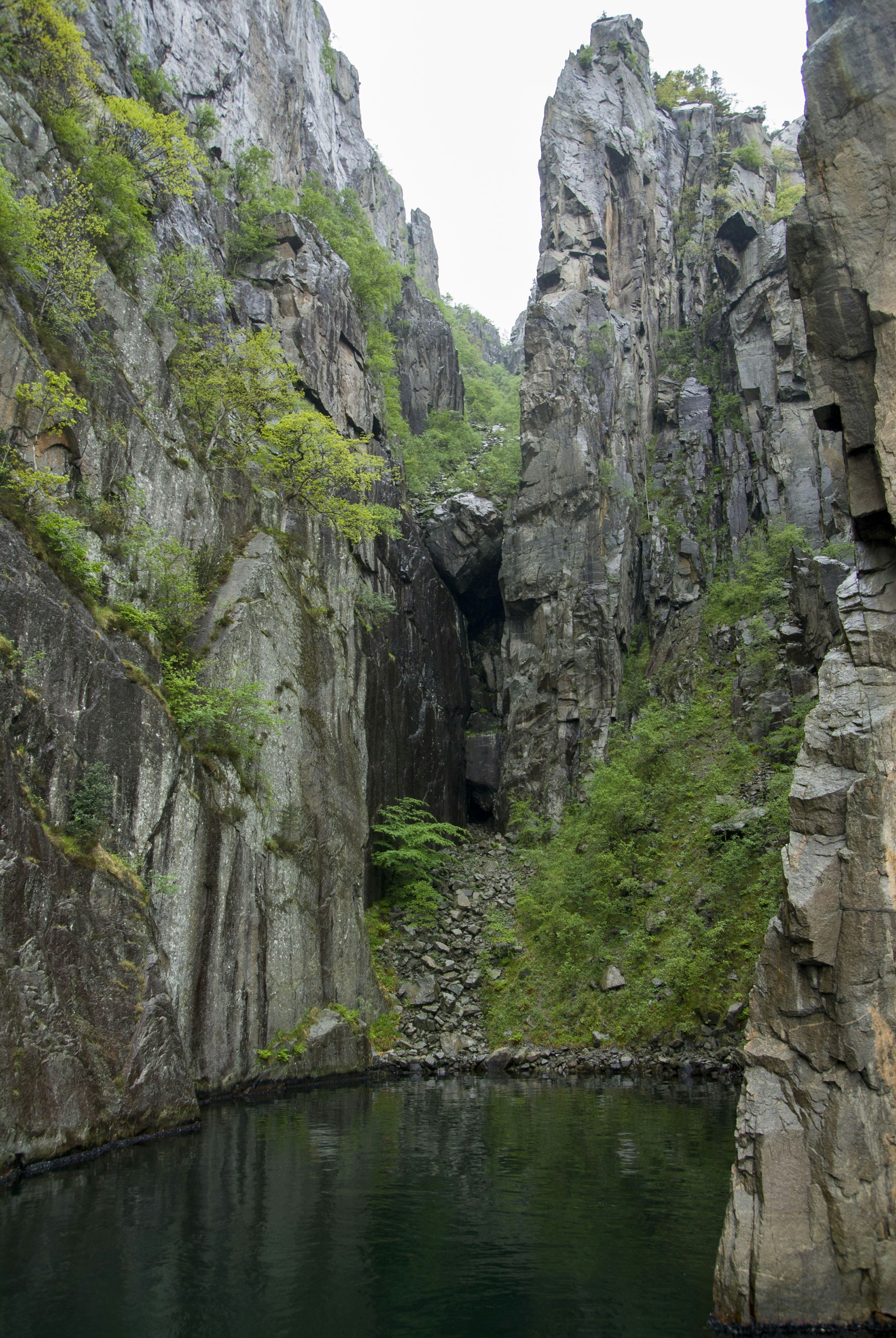 Chasm of Reflections: A Narrow Gorge Between Ancient Pillars
