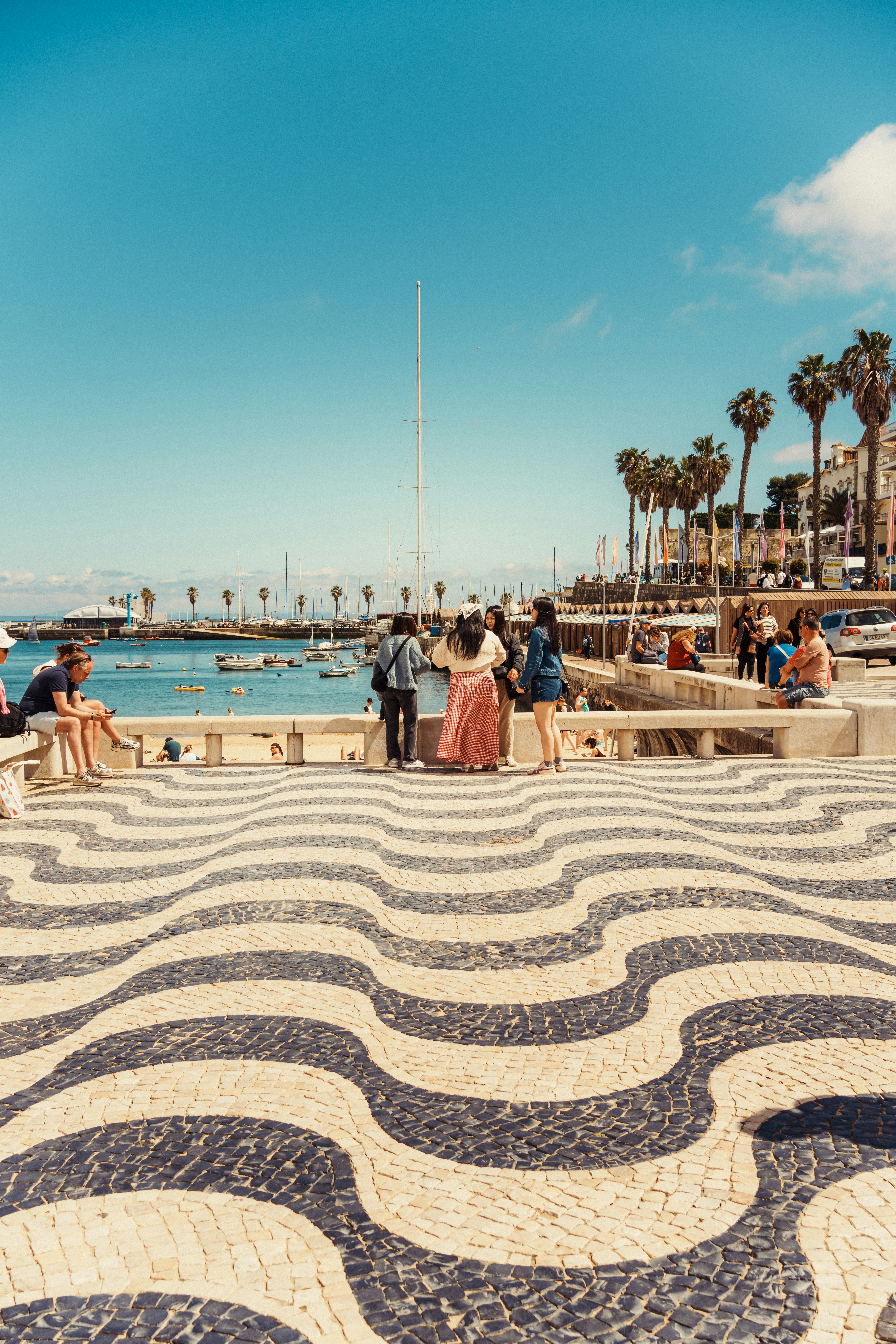 Waves of Pattern and People Along the Seafront Promenade