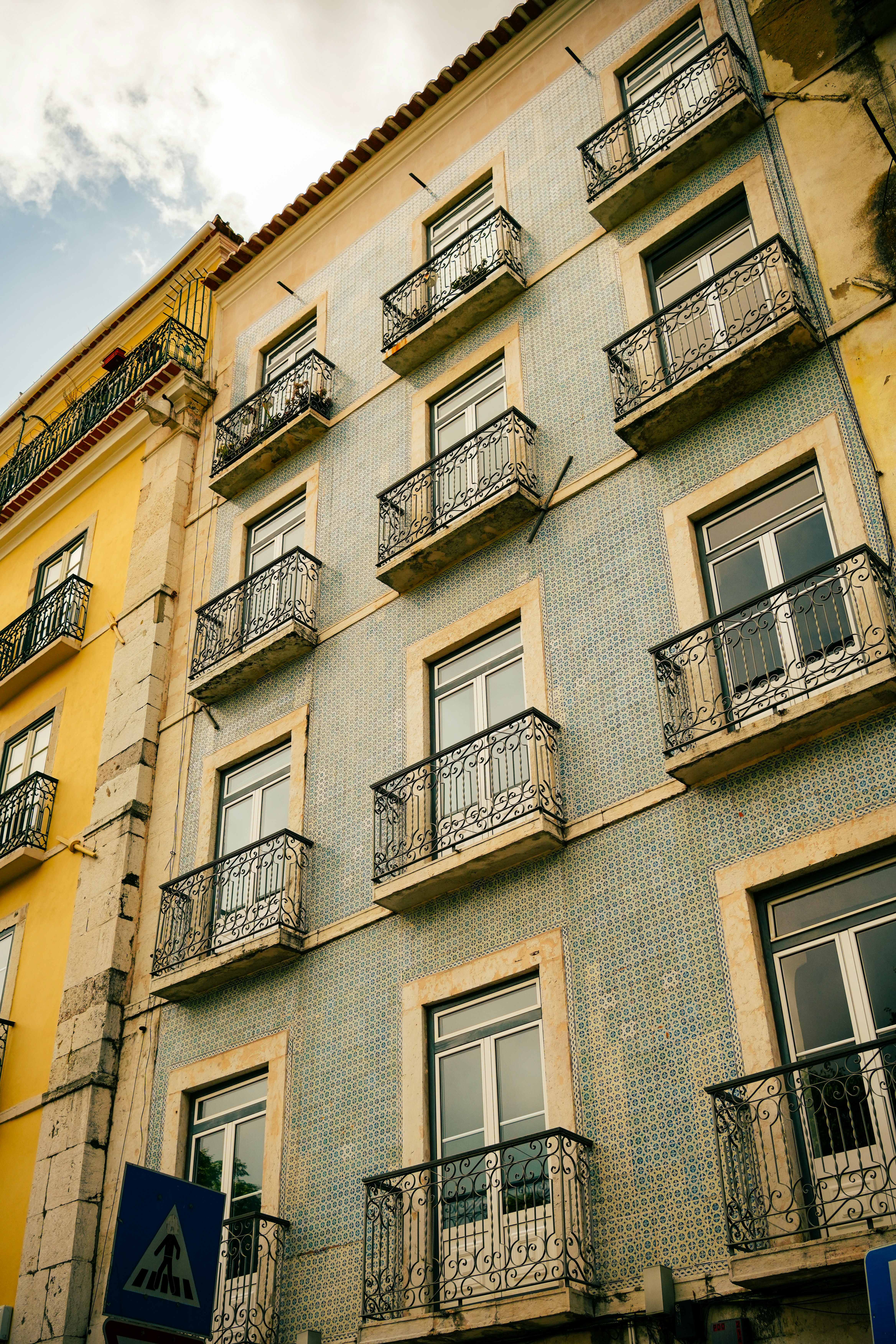 Facade of Lisbon Tiles: Balconied Heights in Morning Light