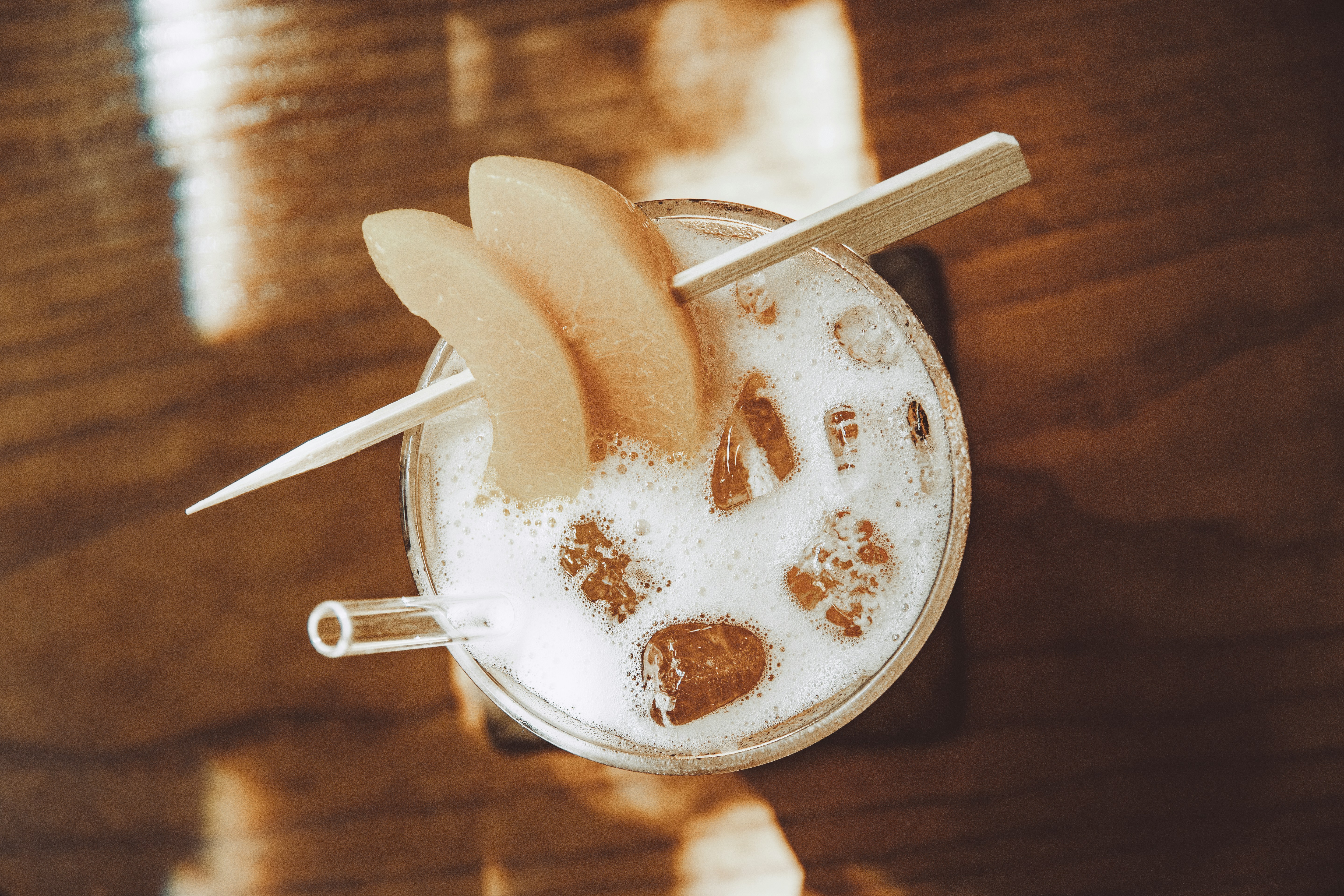 Citrus Reflections: A Top-Down Moment Over Ice and Foam
