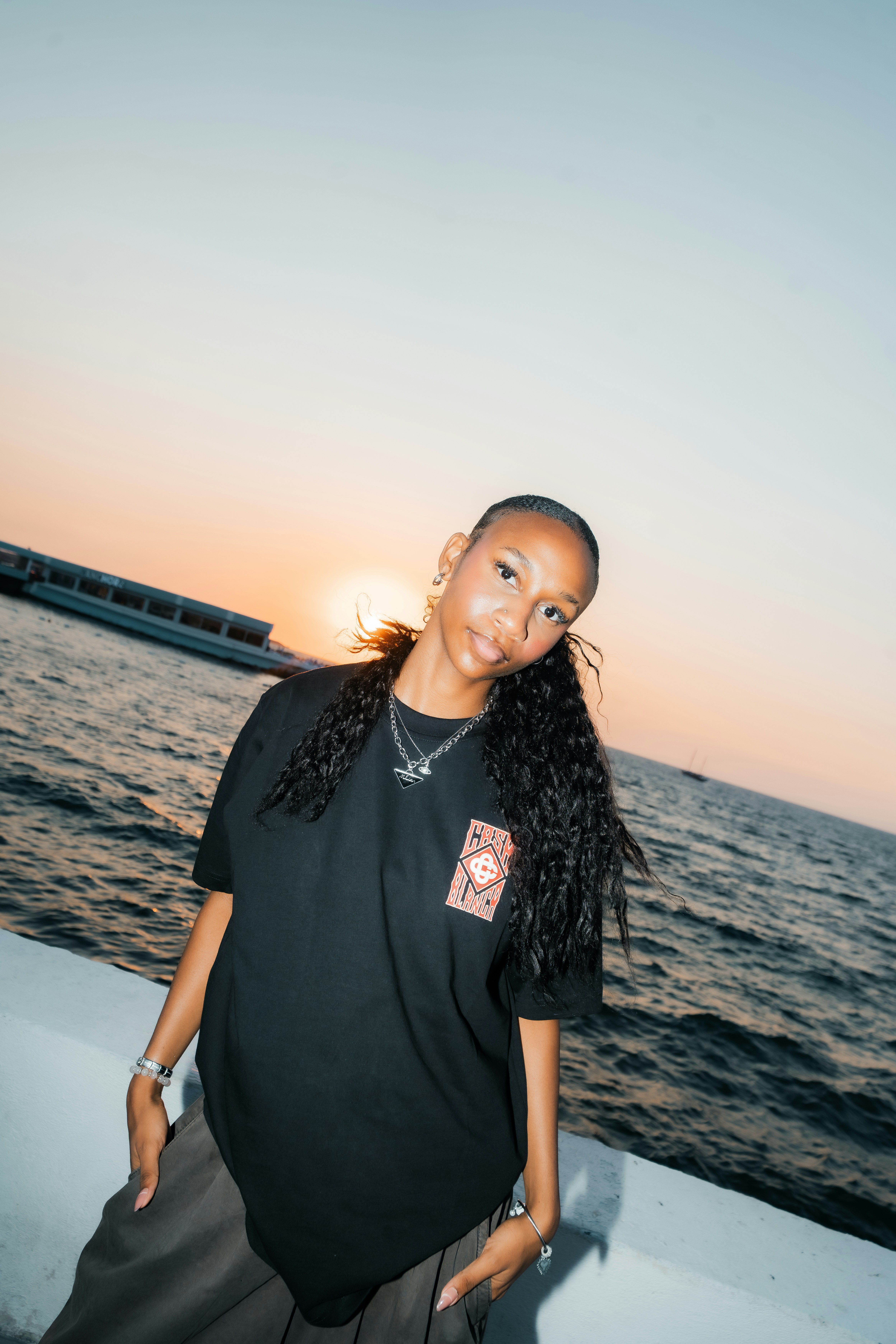 Sunset by the Marina: Portrait at Water's Edge