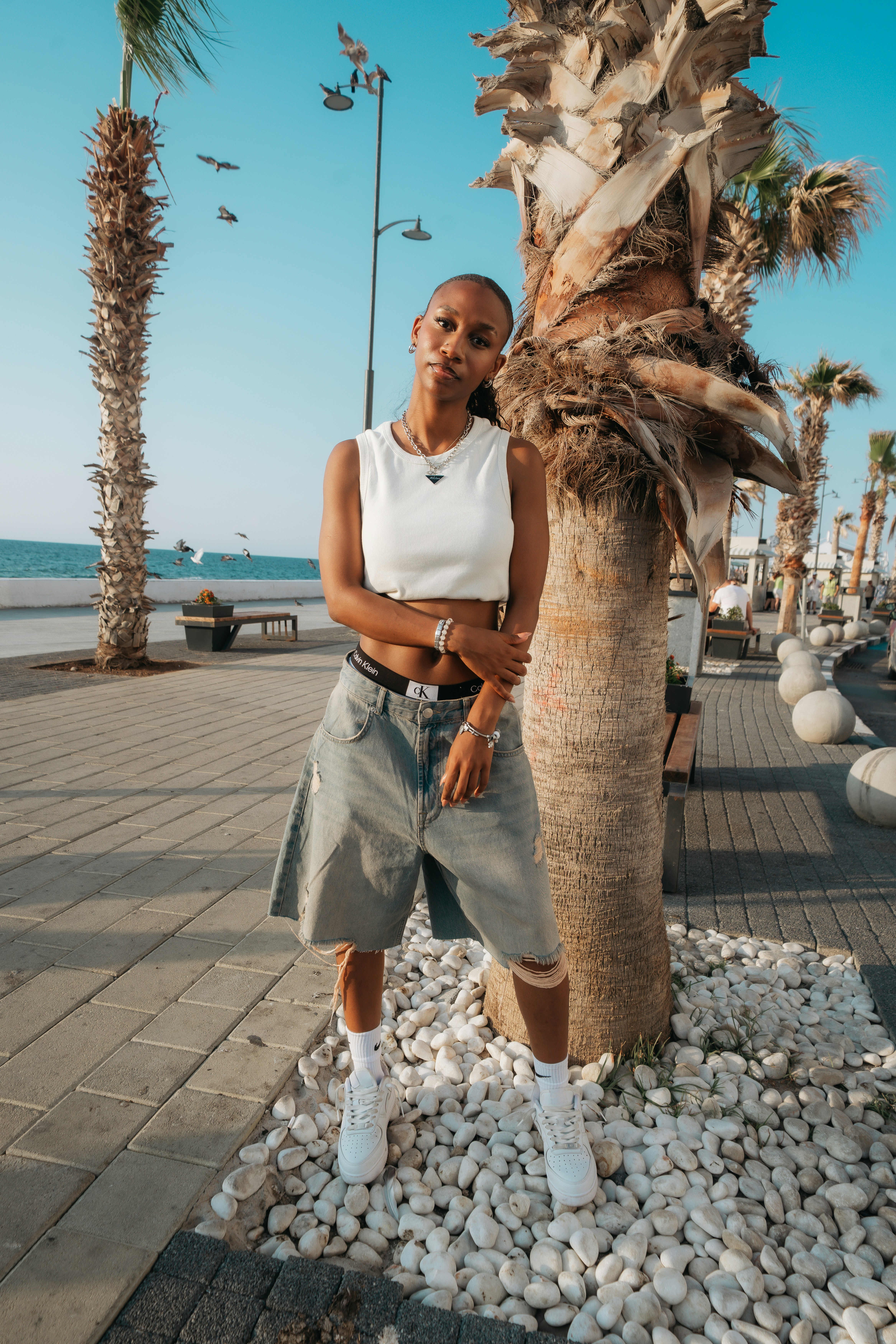 Coastal Confidence: Street-Style Portrait by the Palms