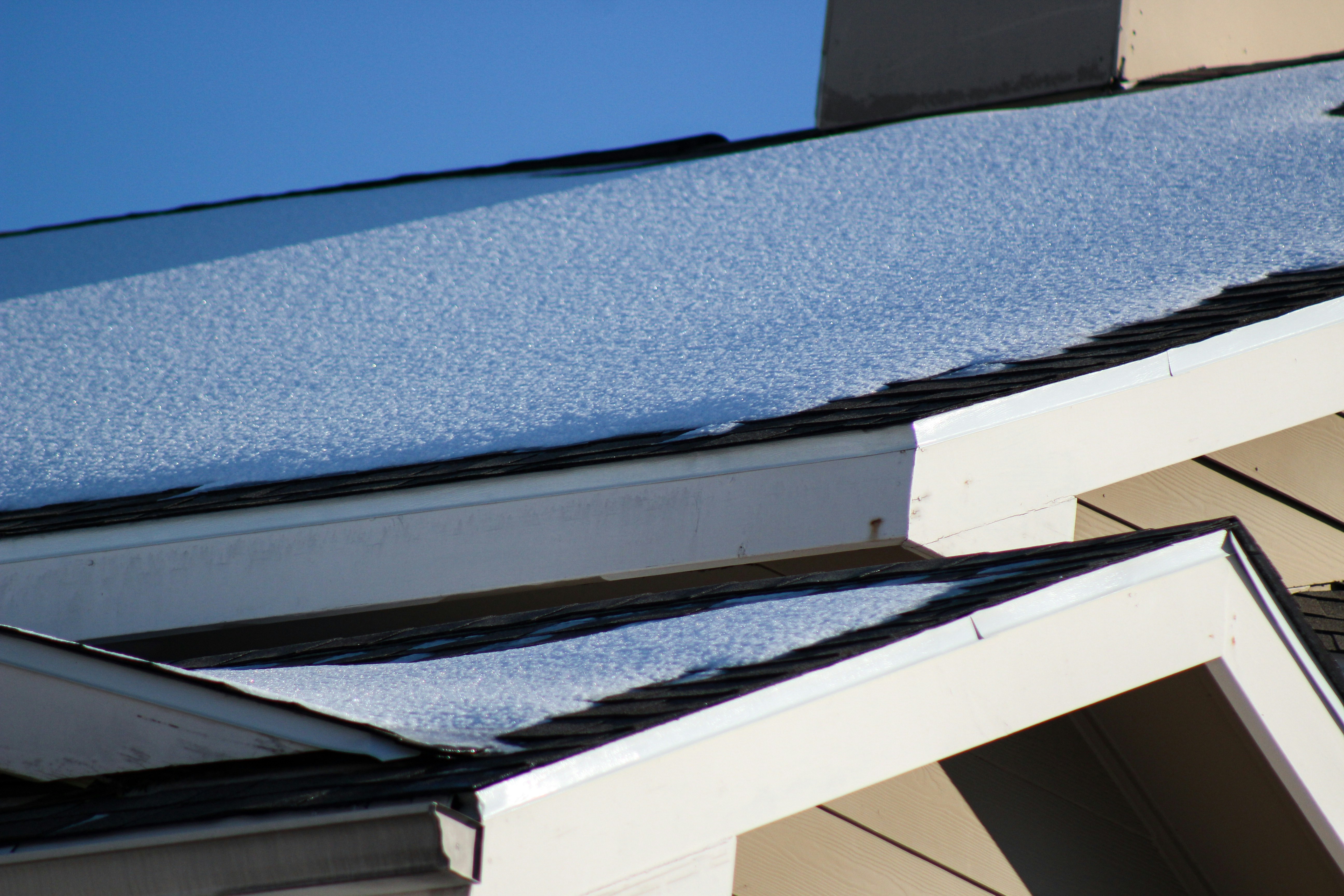 Snow-kissed Roof Lines: A Quiet Architectural Pause