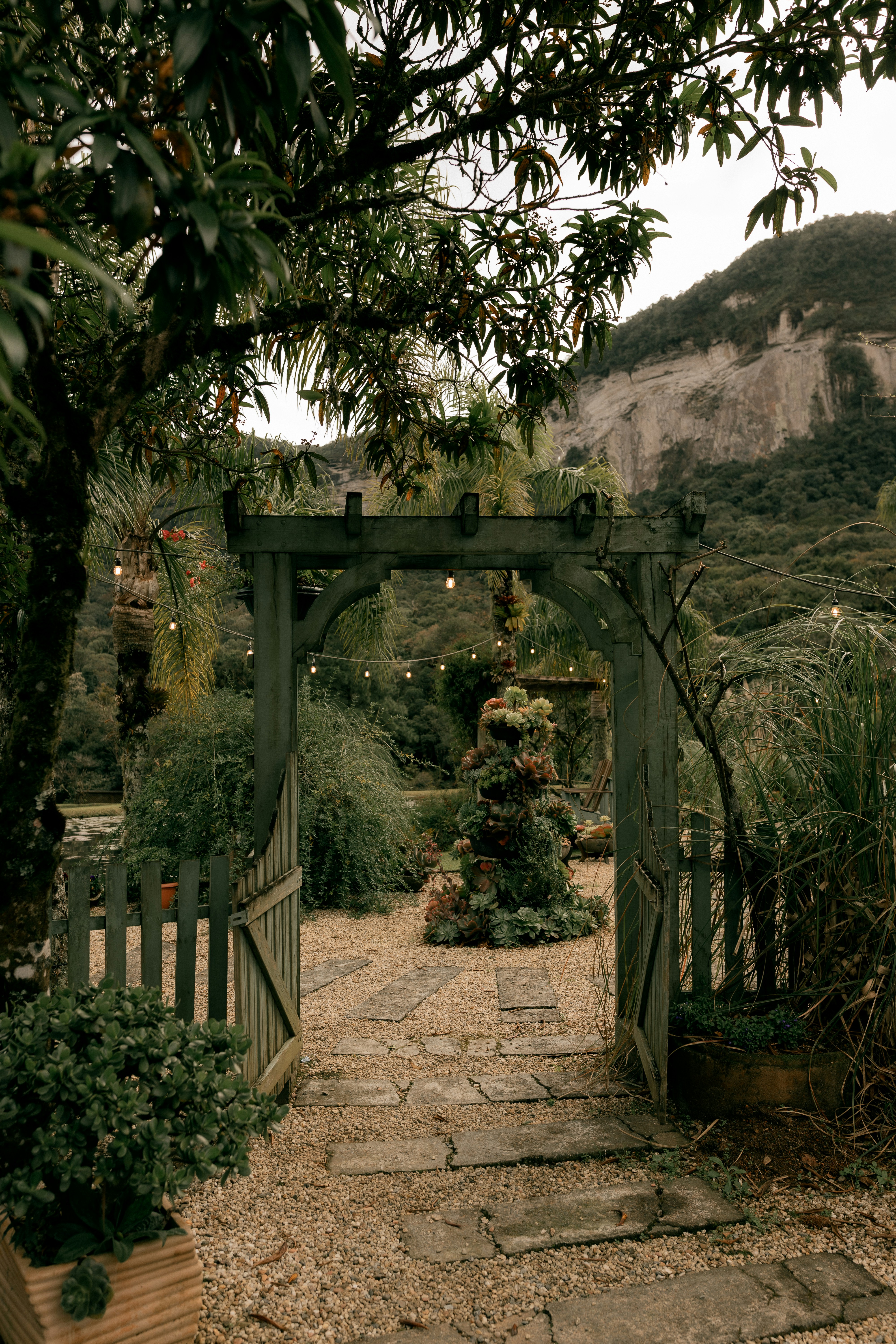 Green Archway Framing a Serene Garden Path