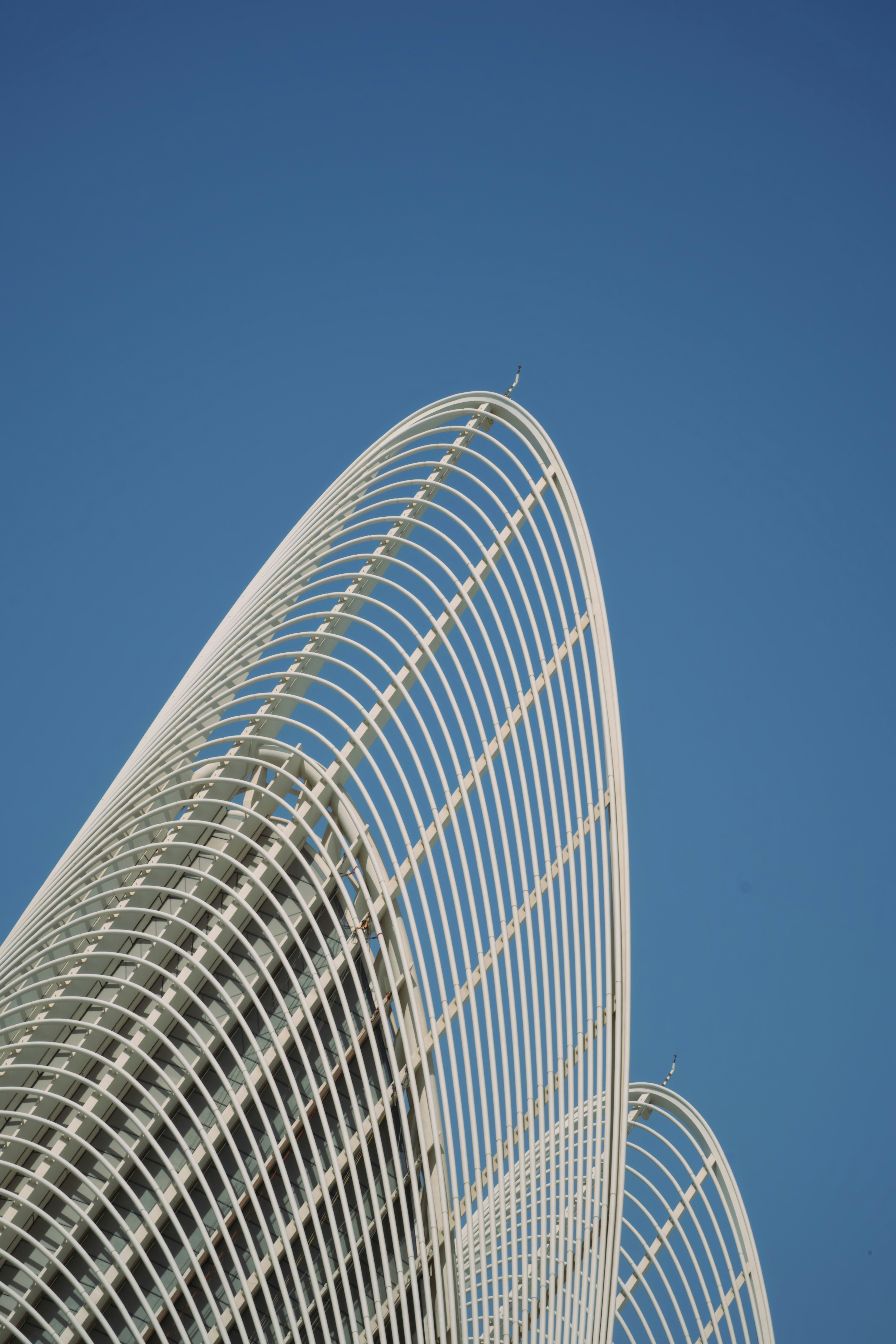 Curved lattice towers Reach for a Clear Sky