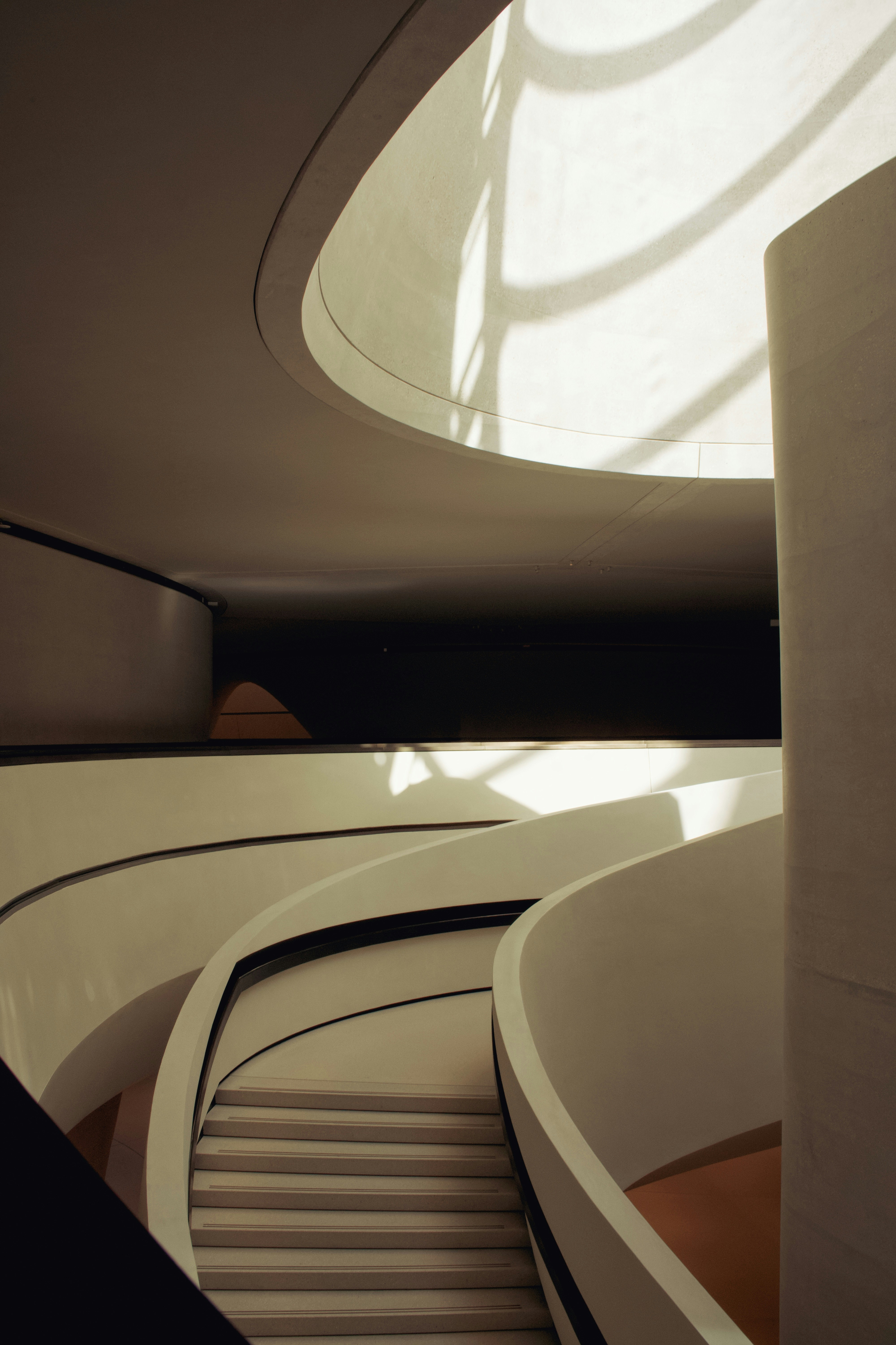 Spiral Light: A Quiet Descent through Modern Curves
