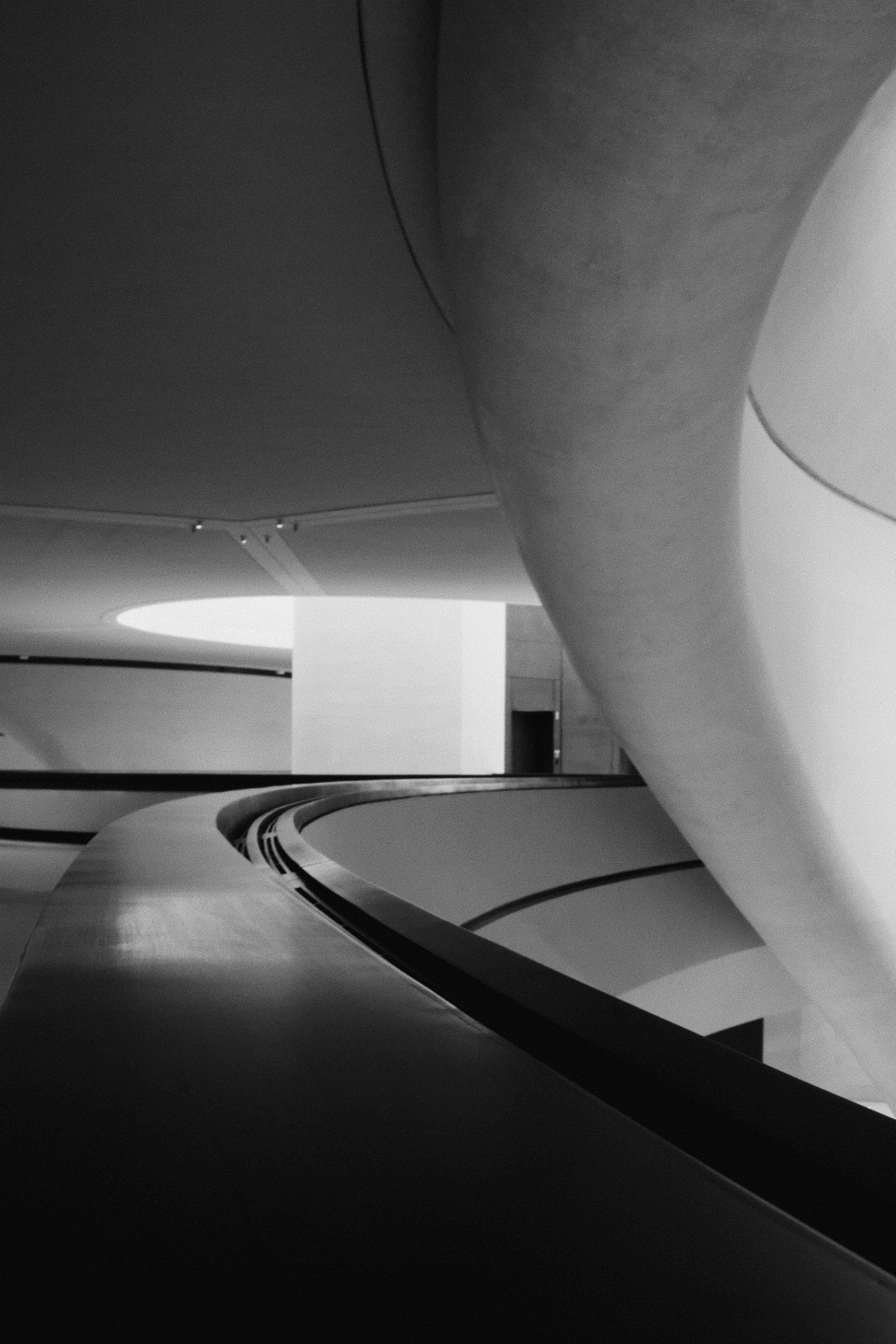 Curved Geometry in Silence: A Monochrome Walk Through an Indoor Spiral