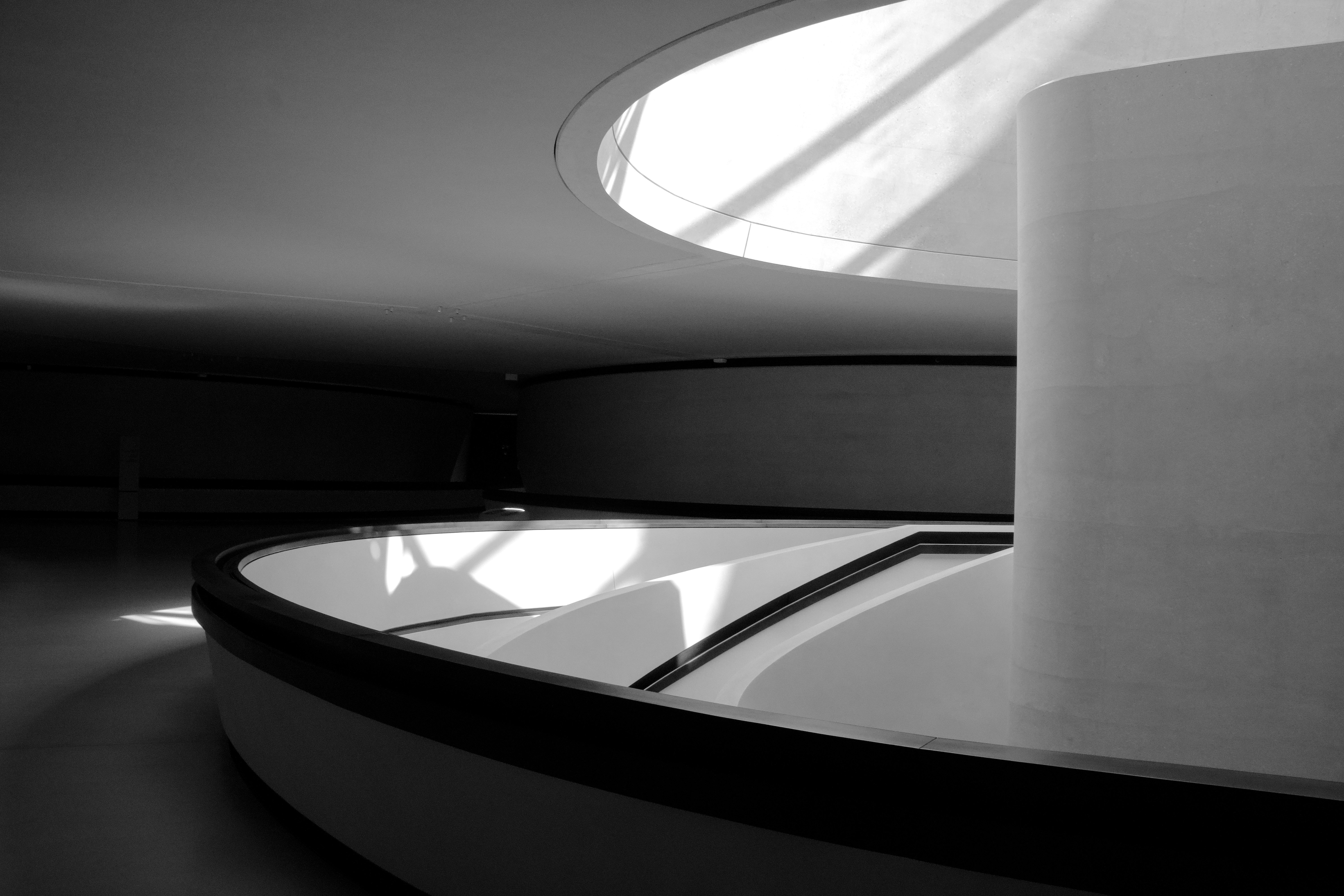 Silent Curves: Light and Shadow in a Spiral Atrium