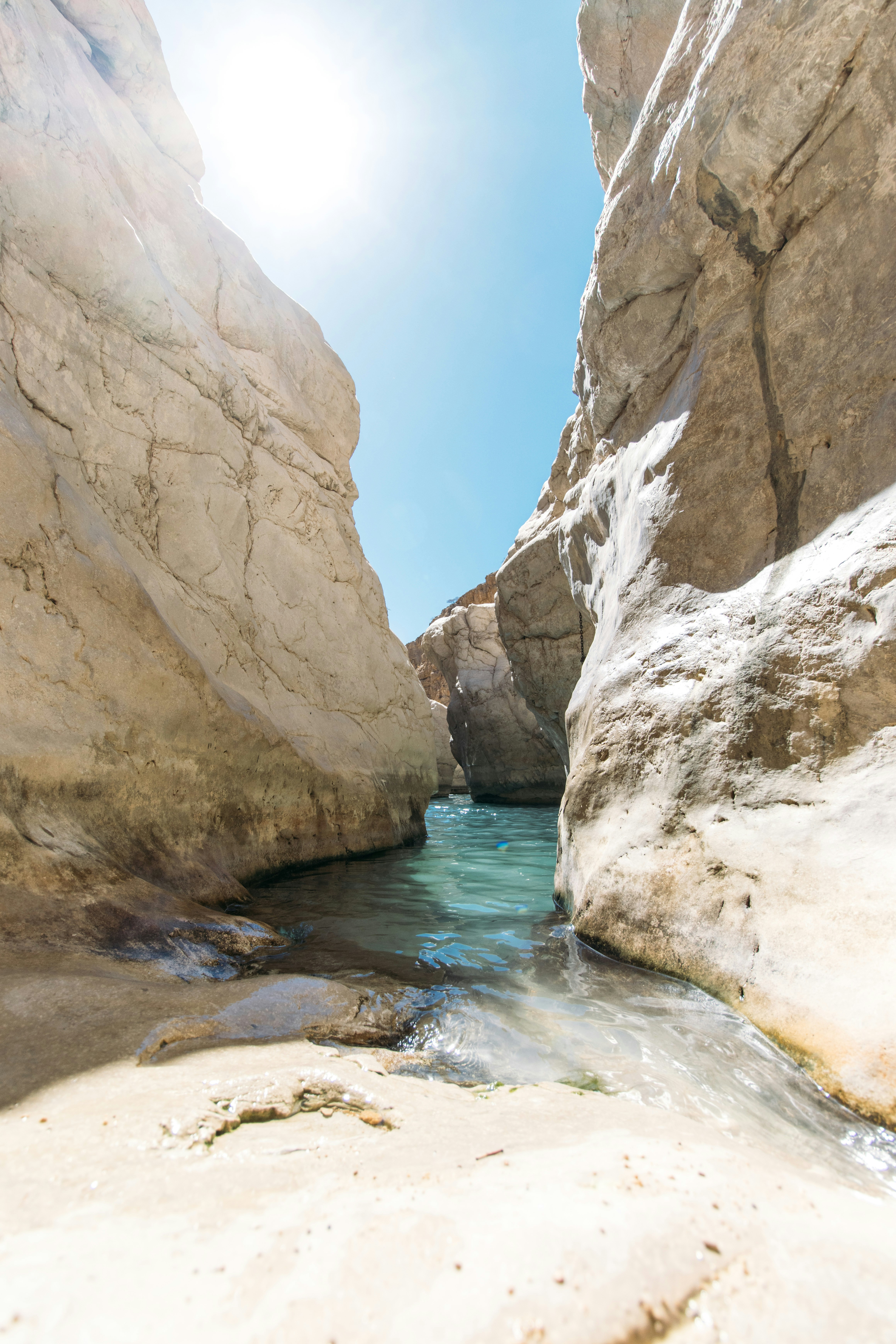 Sunlit Channel Between Desert Cliffs