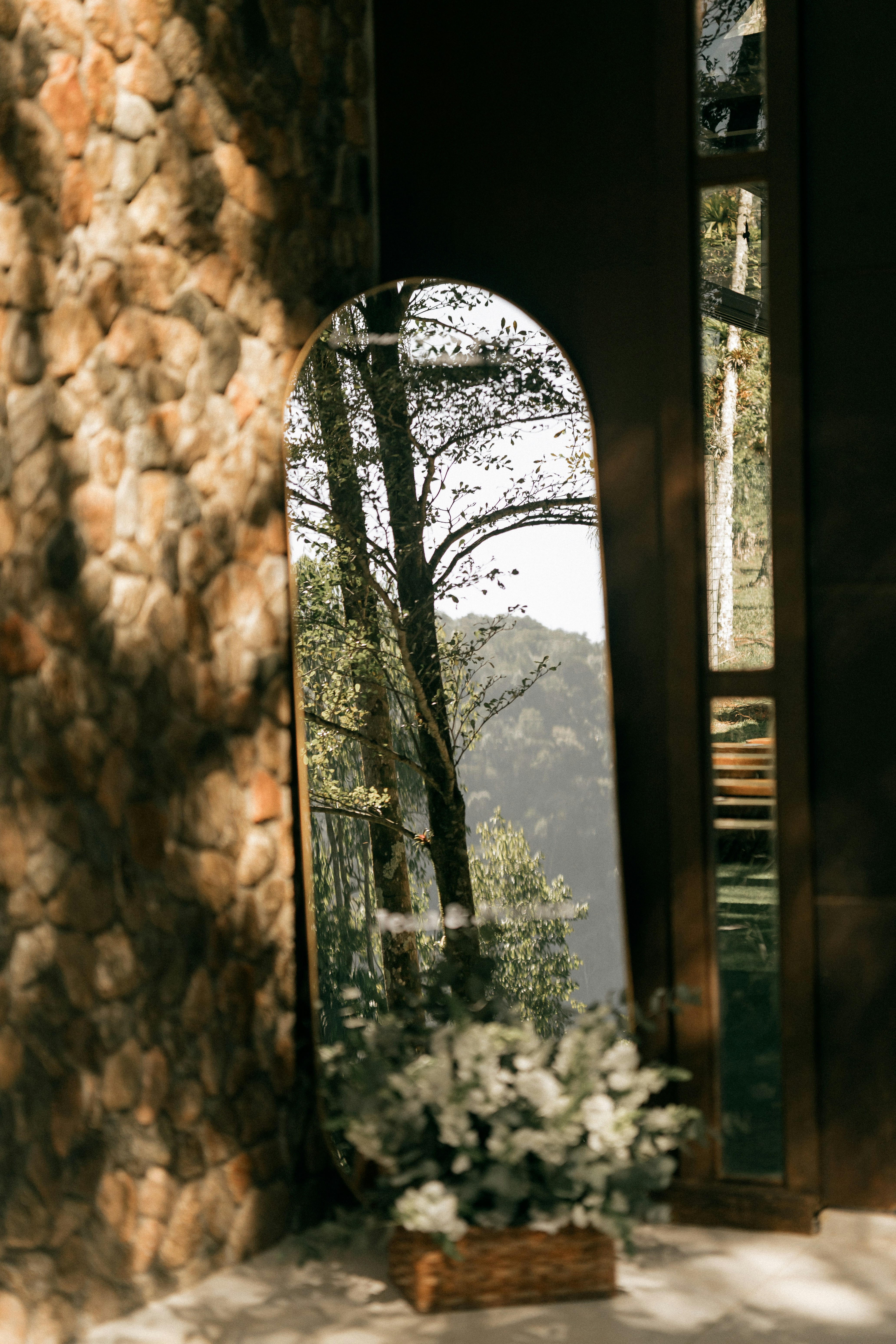 Arc of Light: Sunlit Archway Framing a Verdant View