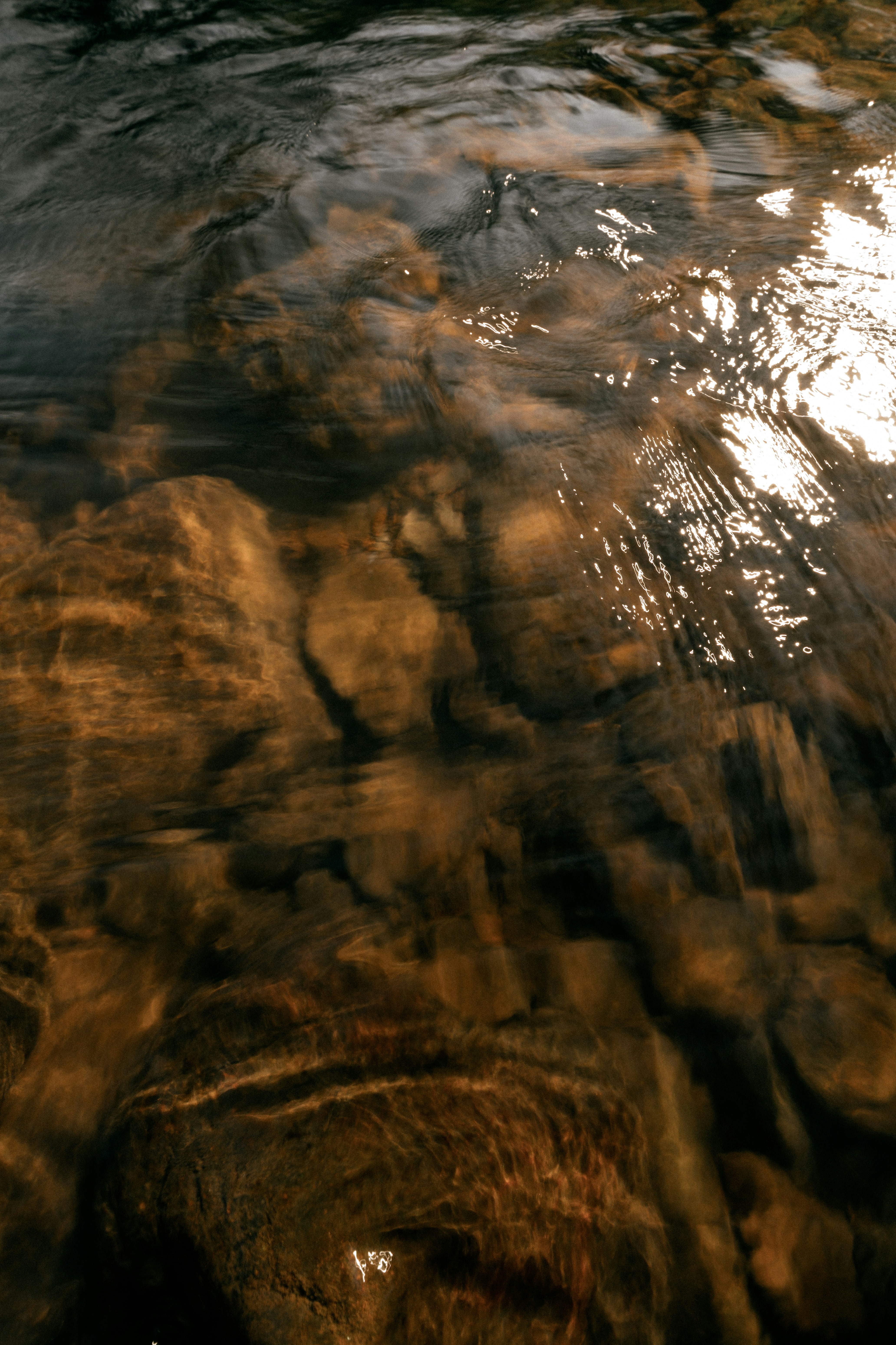 Sunlit Ripples over Submerged Geometry