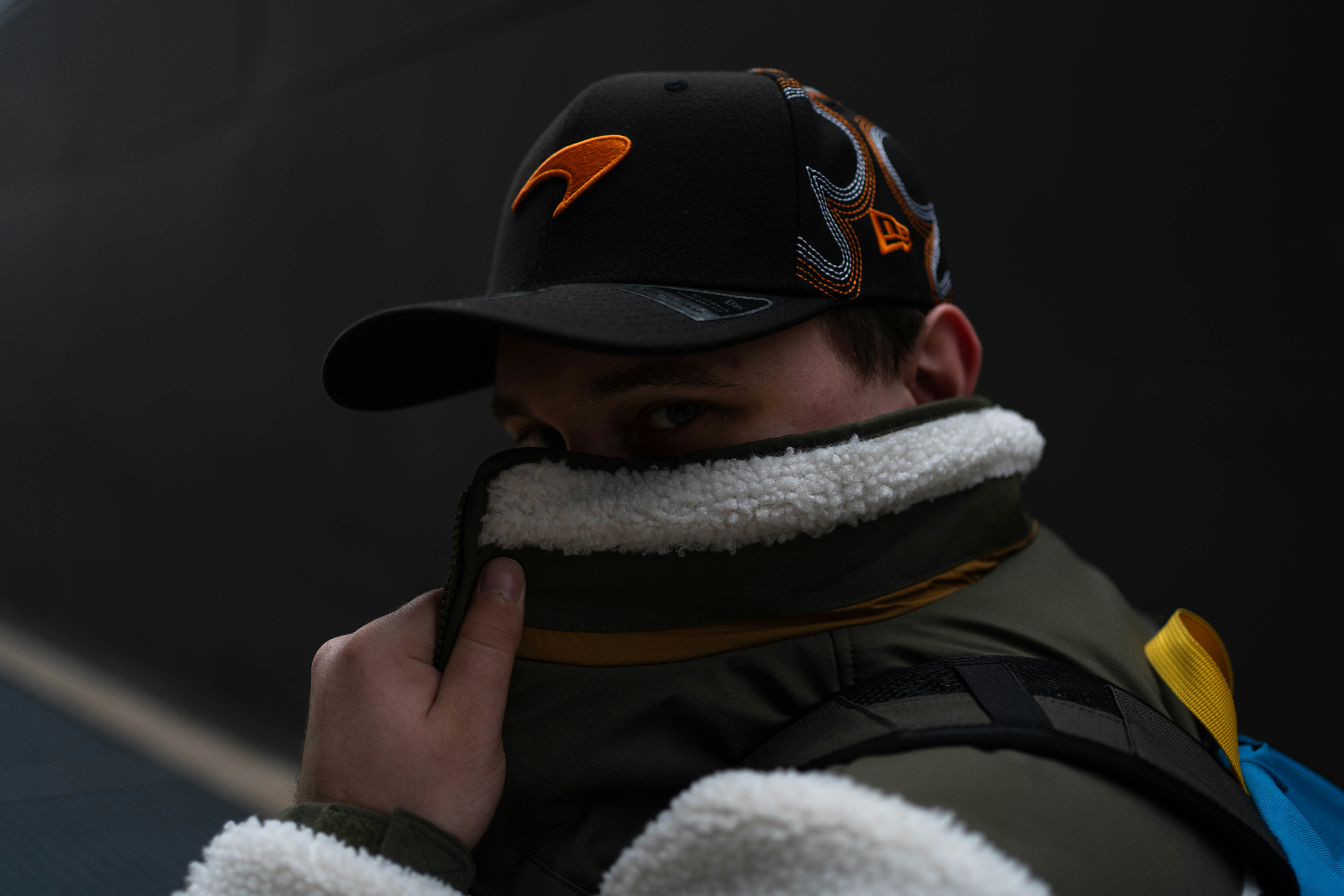 Masked Gaze: A Quiet Portrait in Soft Wool and Shadow