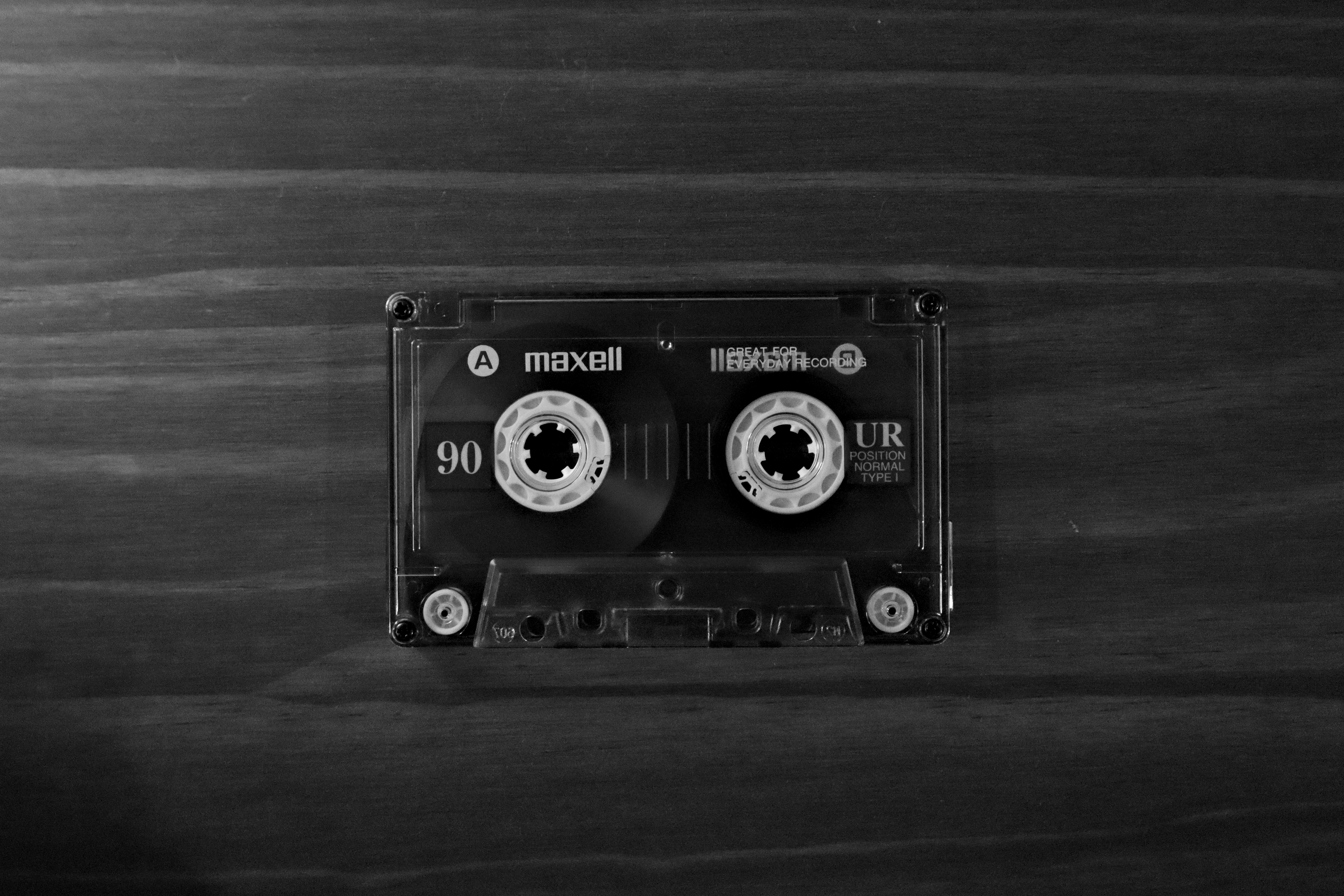 Retro Tape in Focus: A Monochrome Moment on Wood