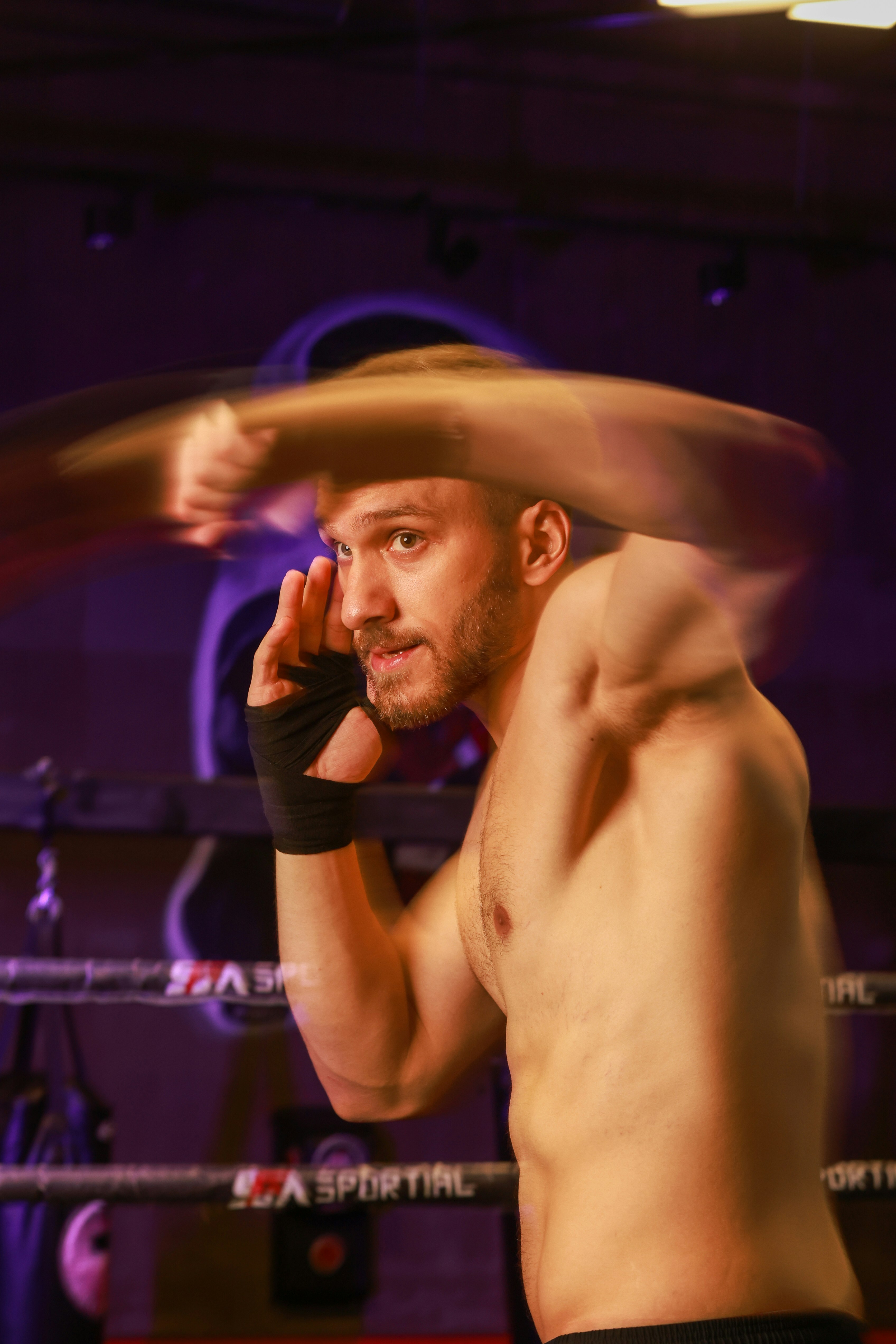 Focused Fury in Neon Gym Lights