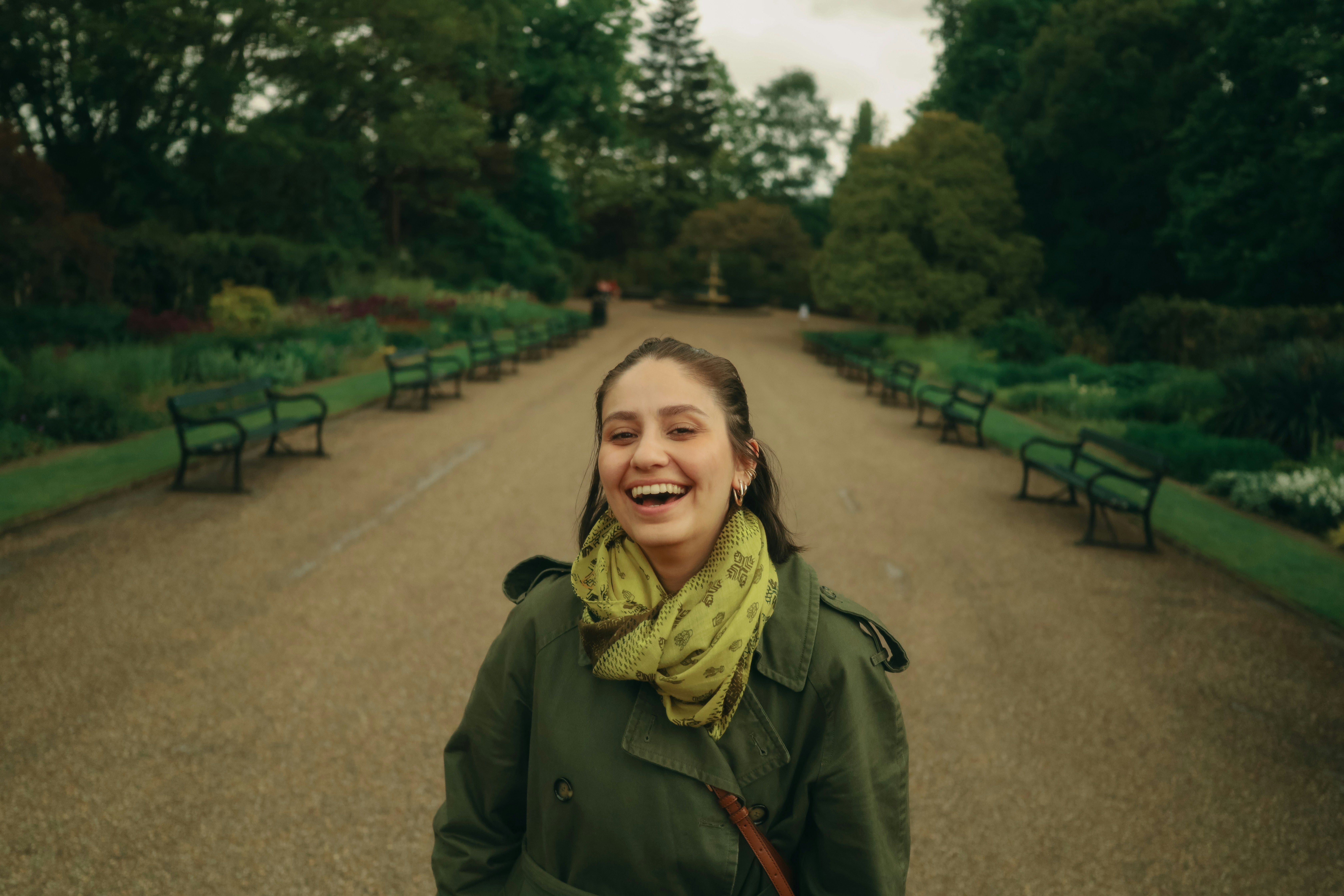 Joy in the Park: A Portrait Amid Green Avenues
