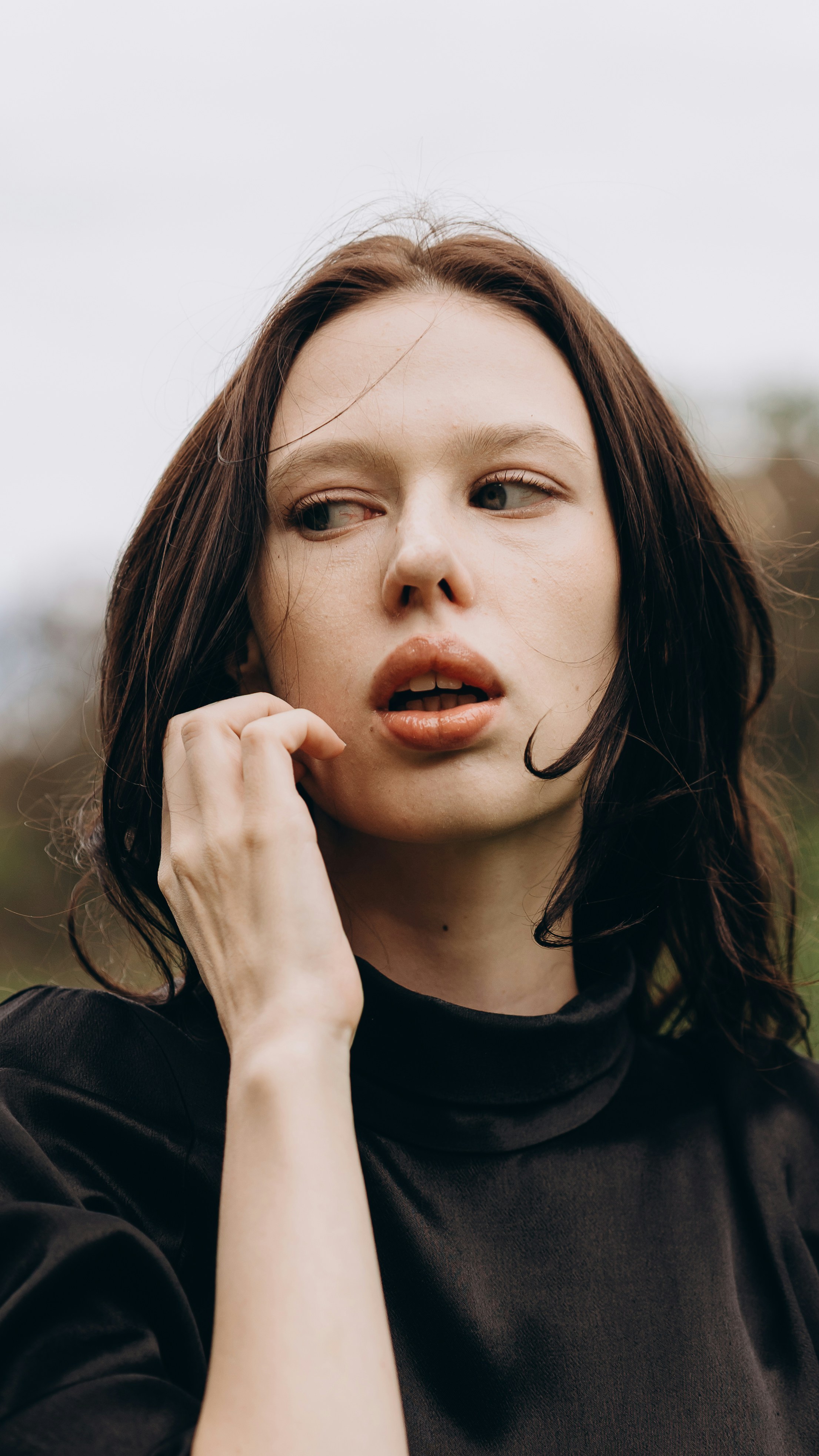 Quiet Gaze: A Portrait in Windy Light