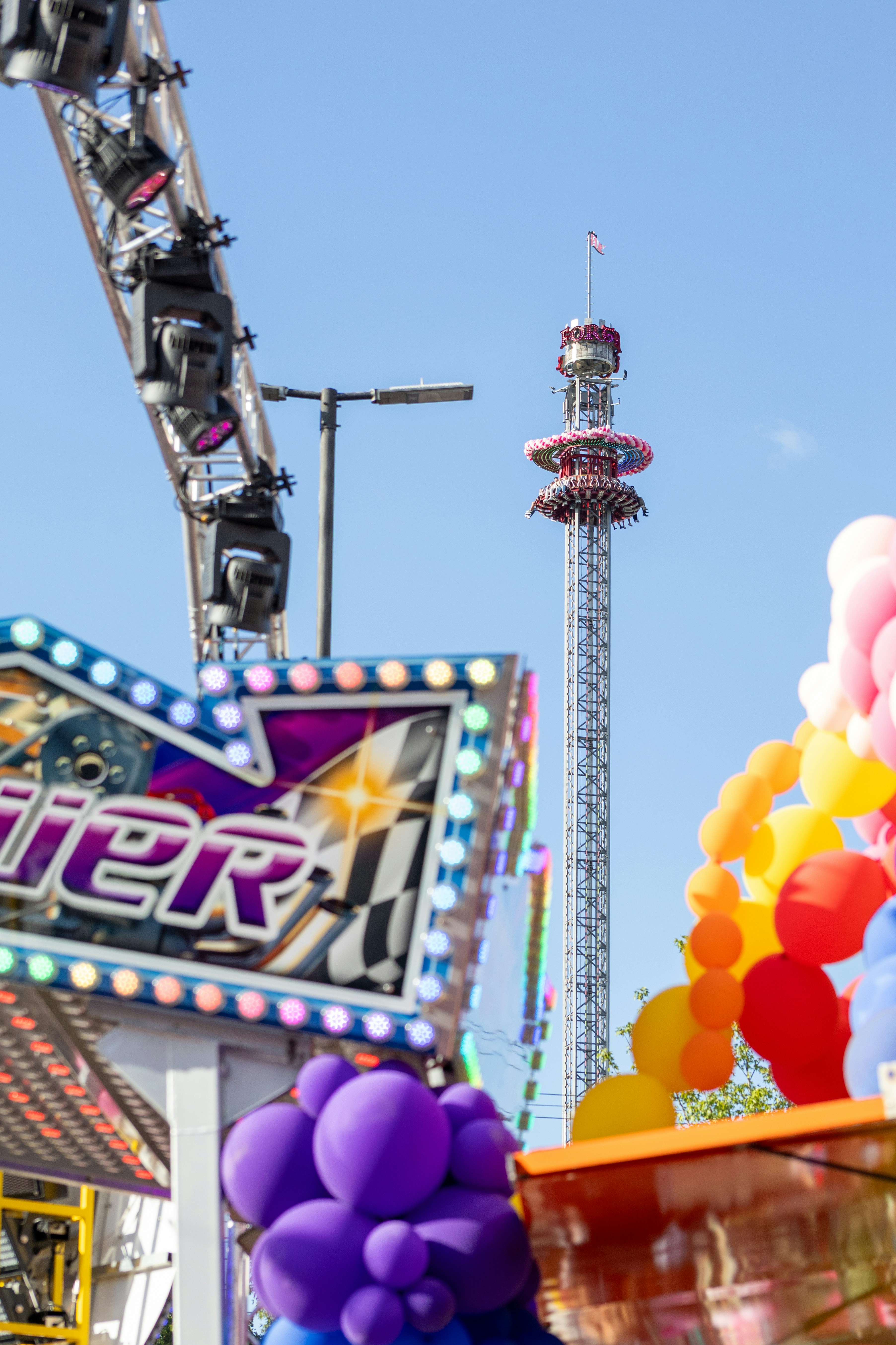 Colorful Carnival Facade Framing a Skyward Tower