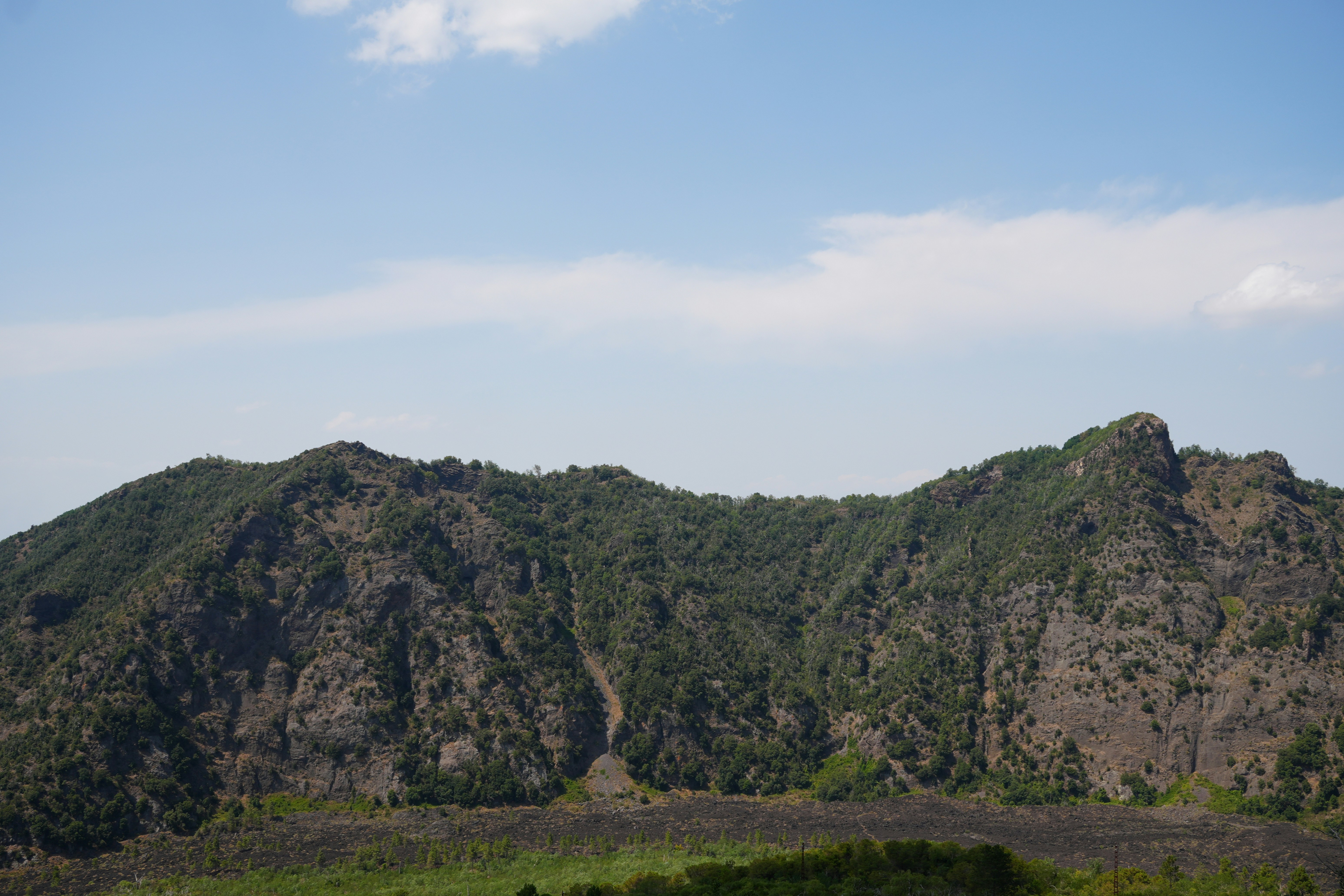 Guardians of the Ridge: Pitched Hills Beneath a Quiet Sky