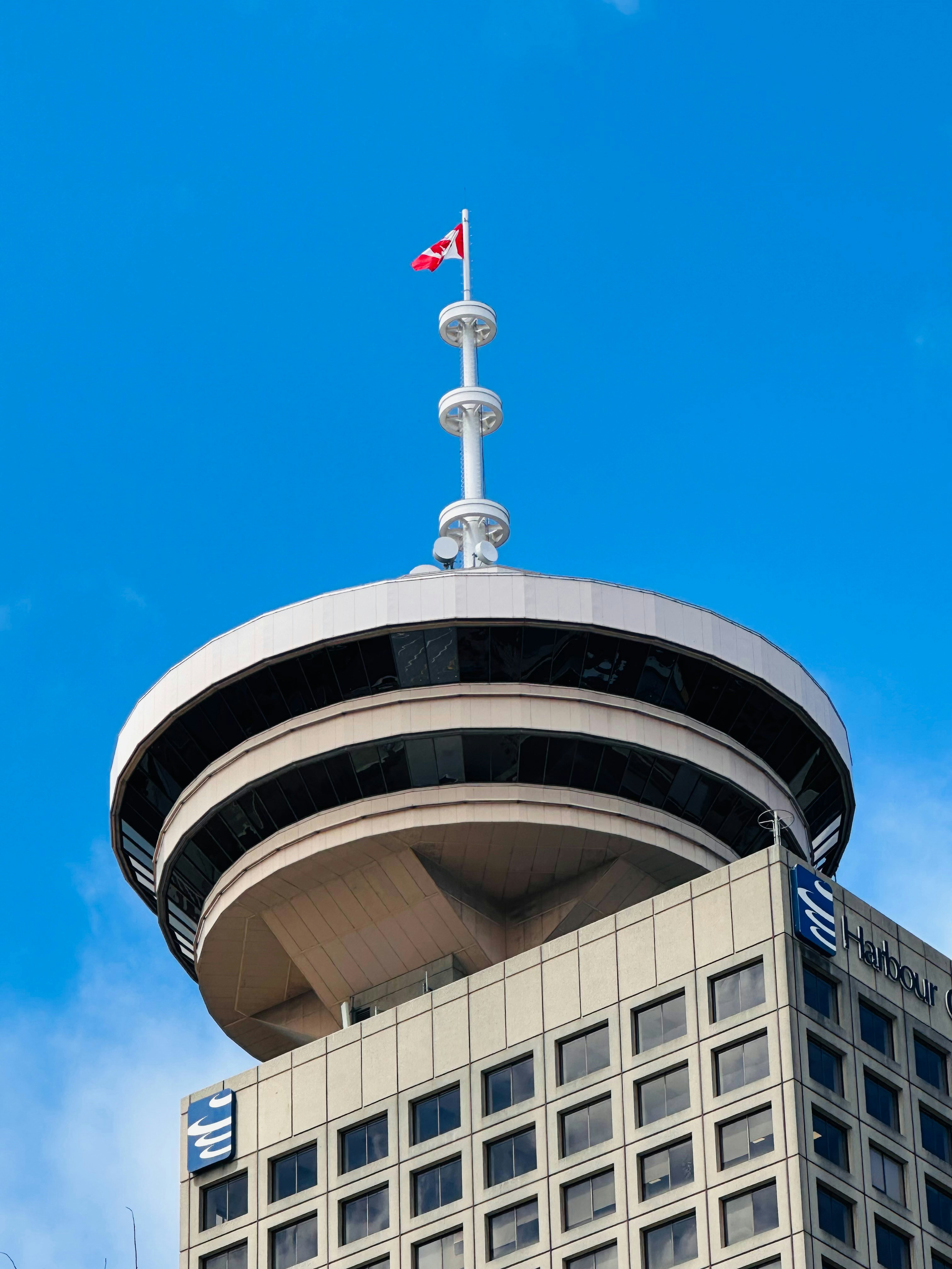 Cloud-slice Observation: A Tower Crest Framed Against a Clear Blue Sky