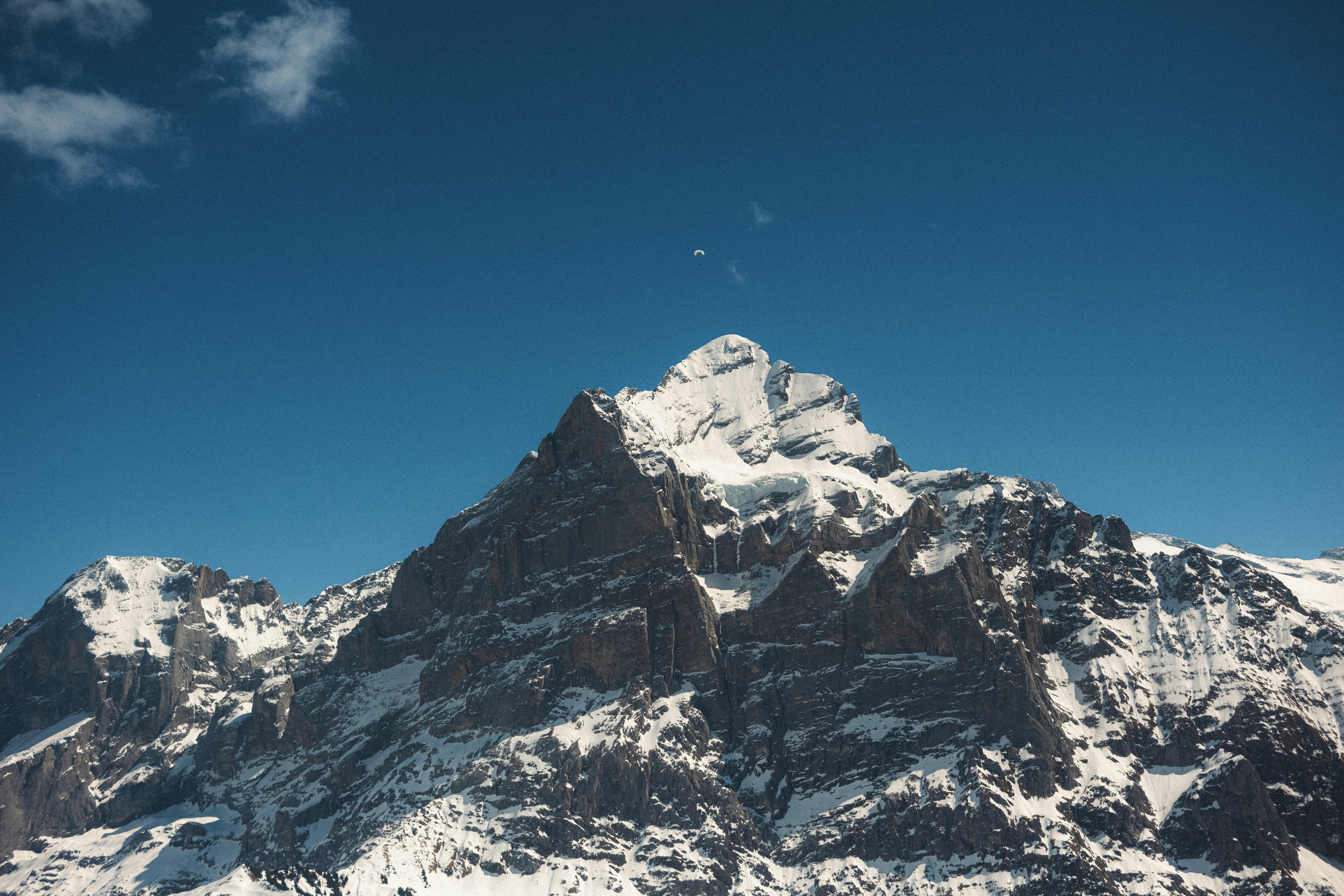 Dominant Peak Under a Clear, Azure Sea