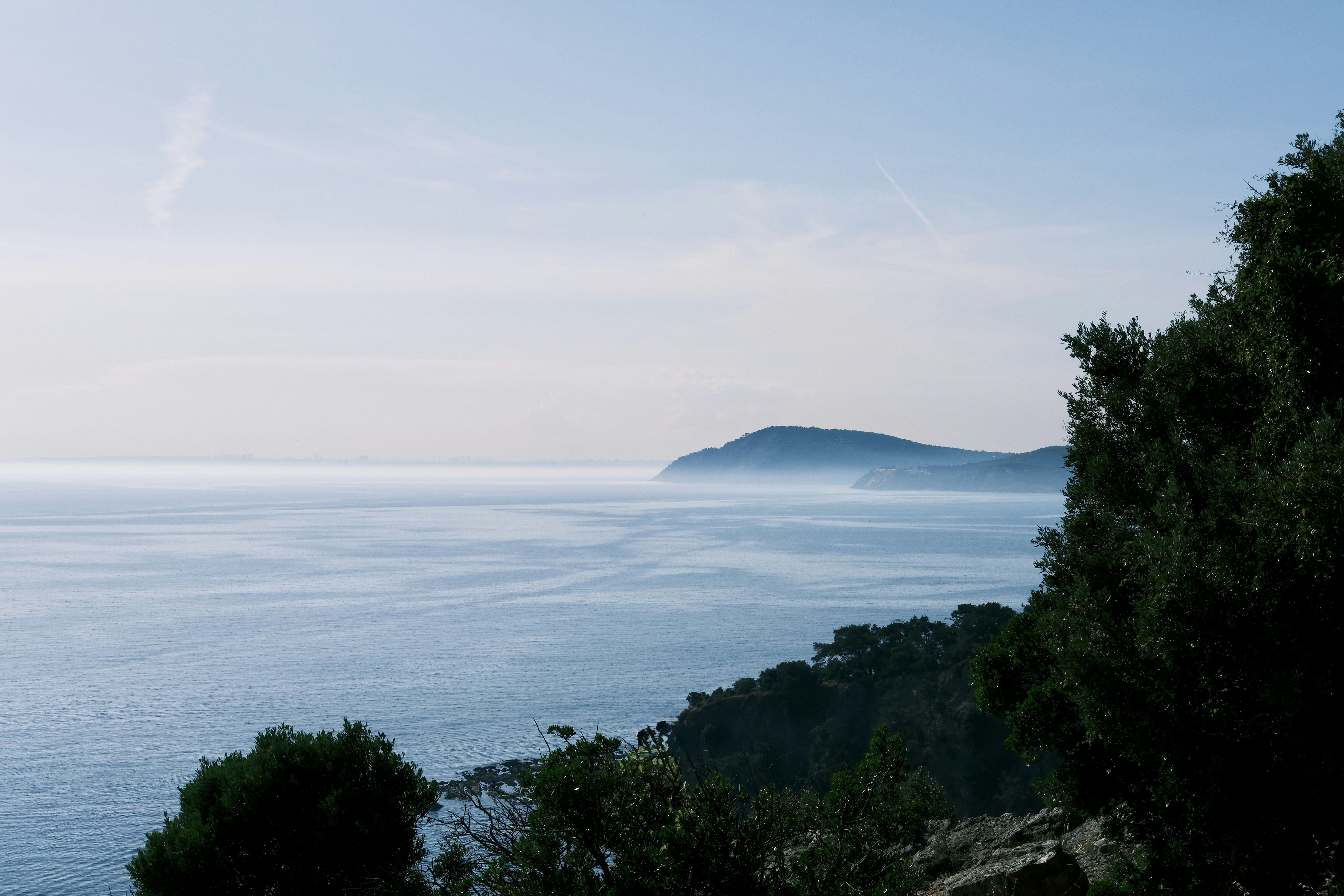 Coastal Crest: A Quiet Arc Over the Sea
