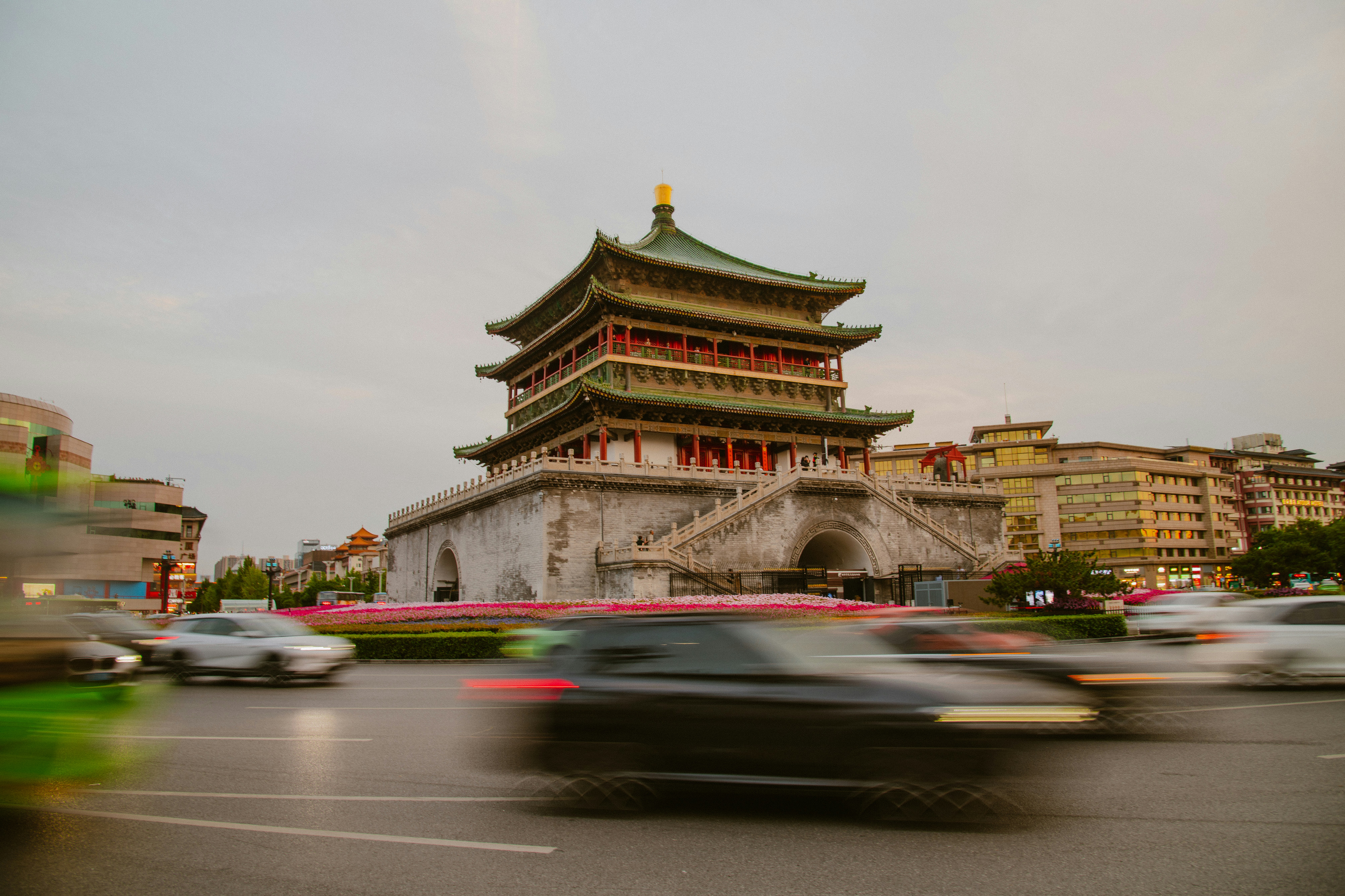 The Gate of Time: A Timeless Pagoda Amid City Motion