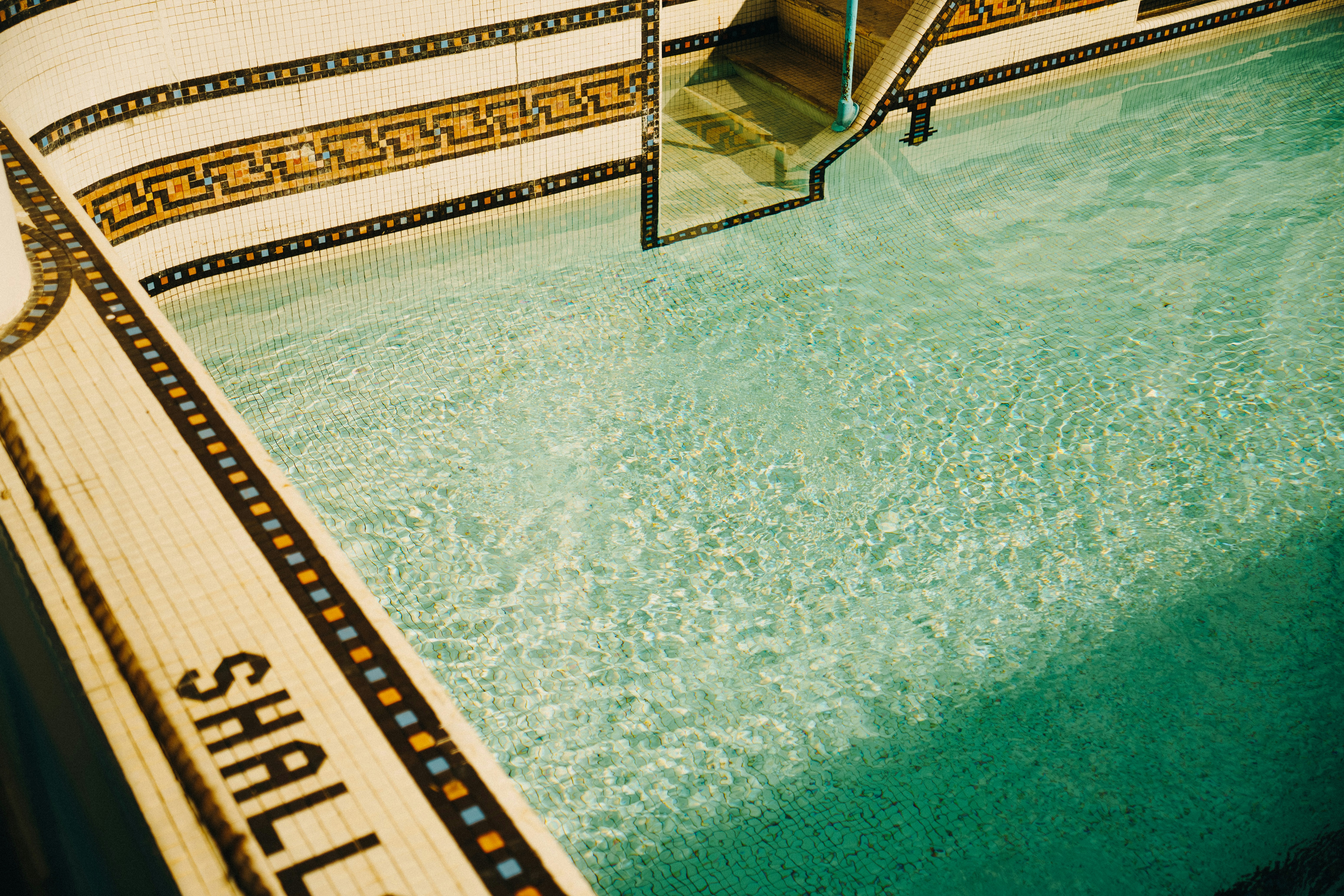Sunlit Pool Edges and Steps in Retro Tile Frame