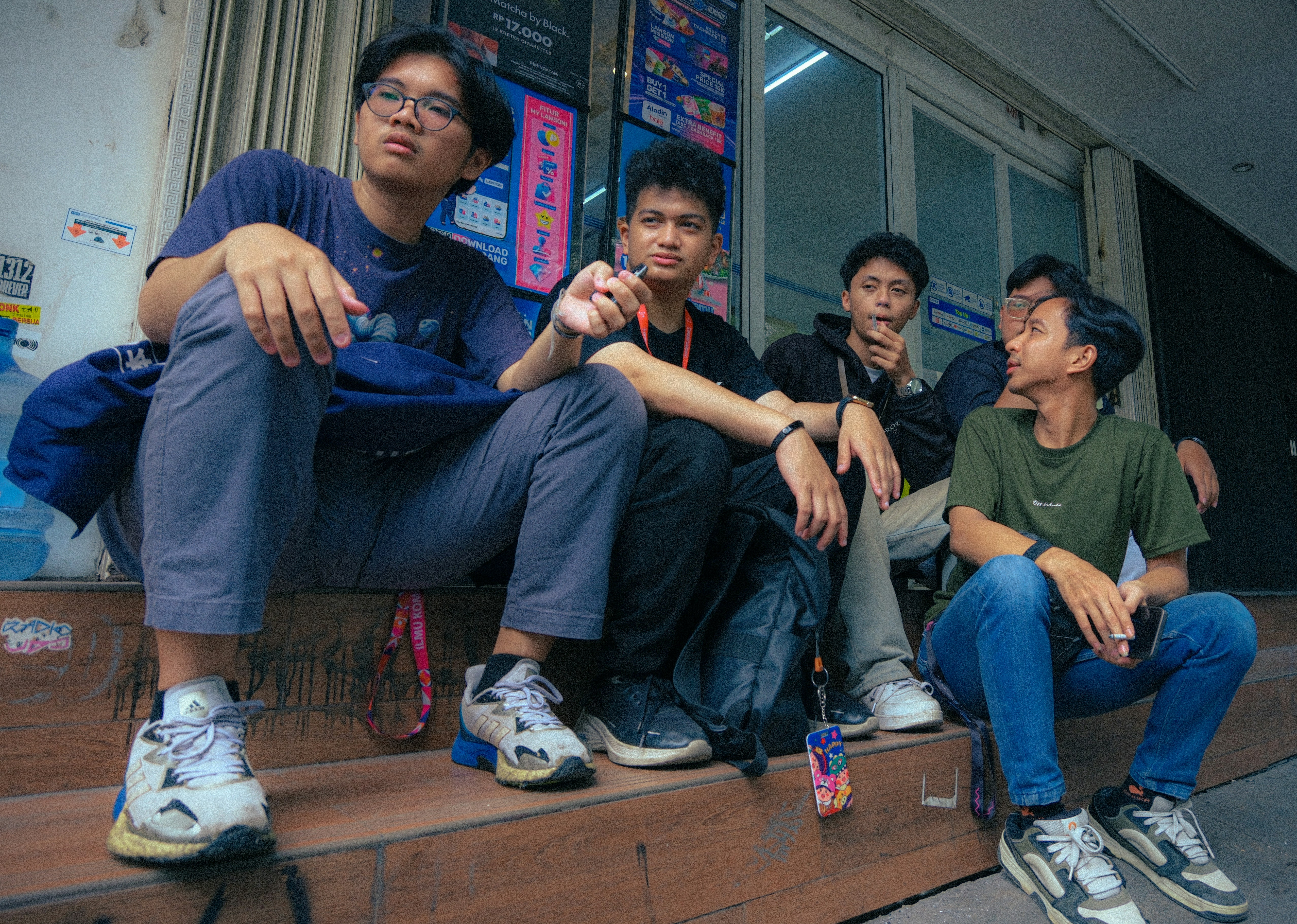 Crew of the Corner Store: Casual Confidence on the Steps
