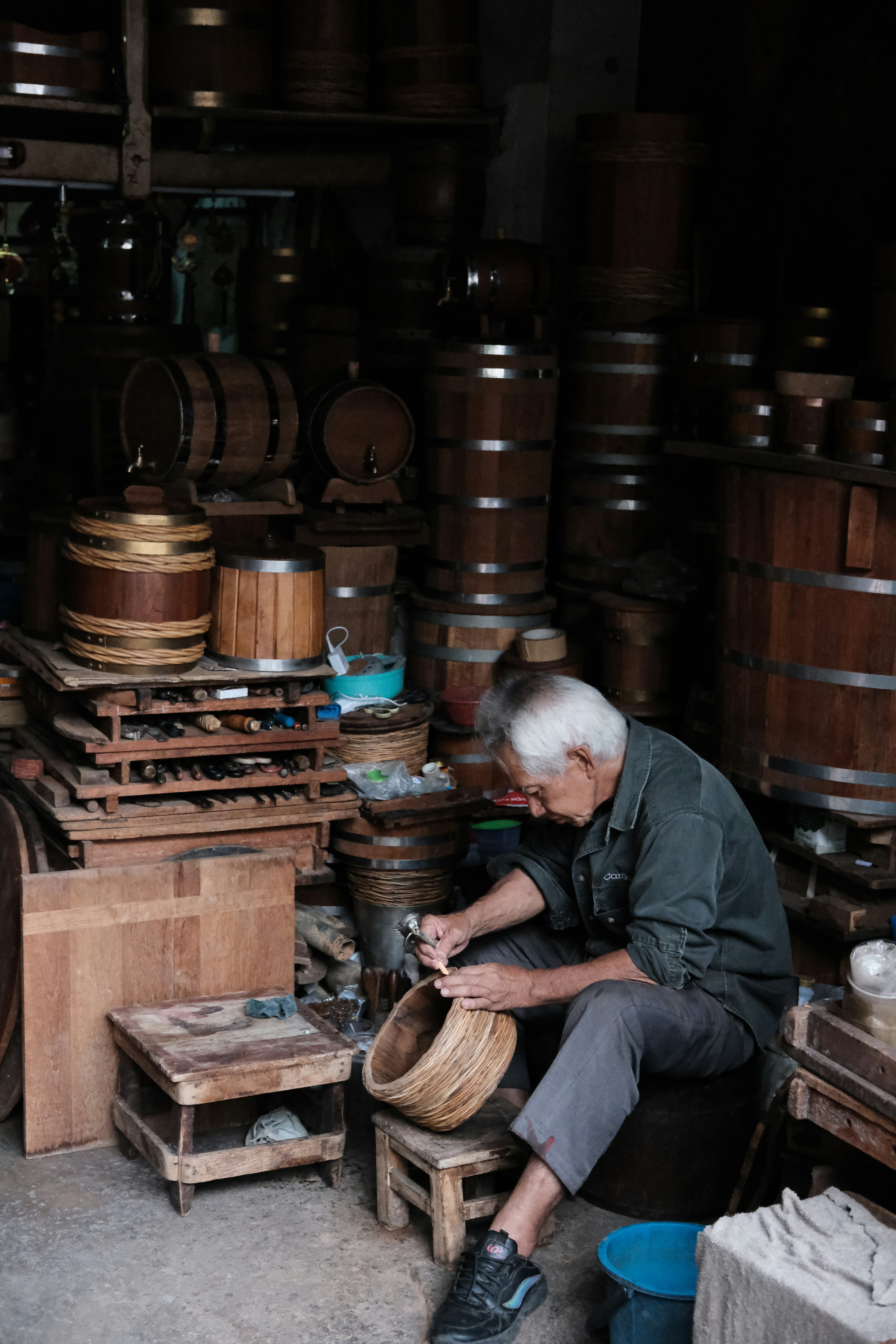 Whittled Time: Crafting in a Barrel-Strewn Workshop