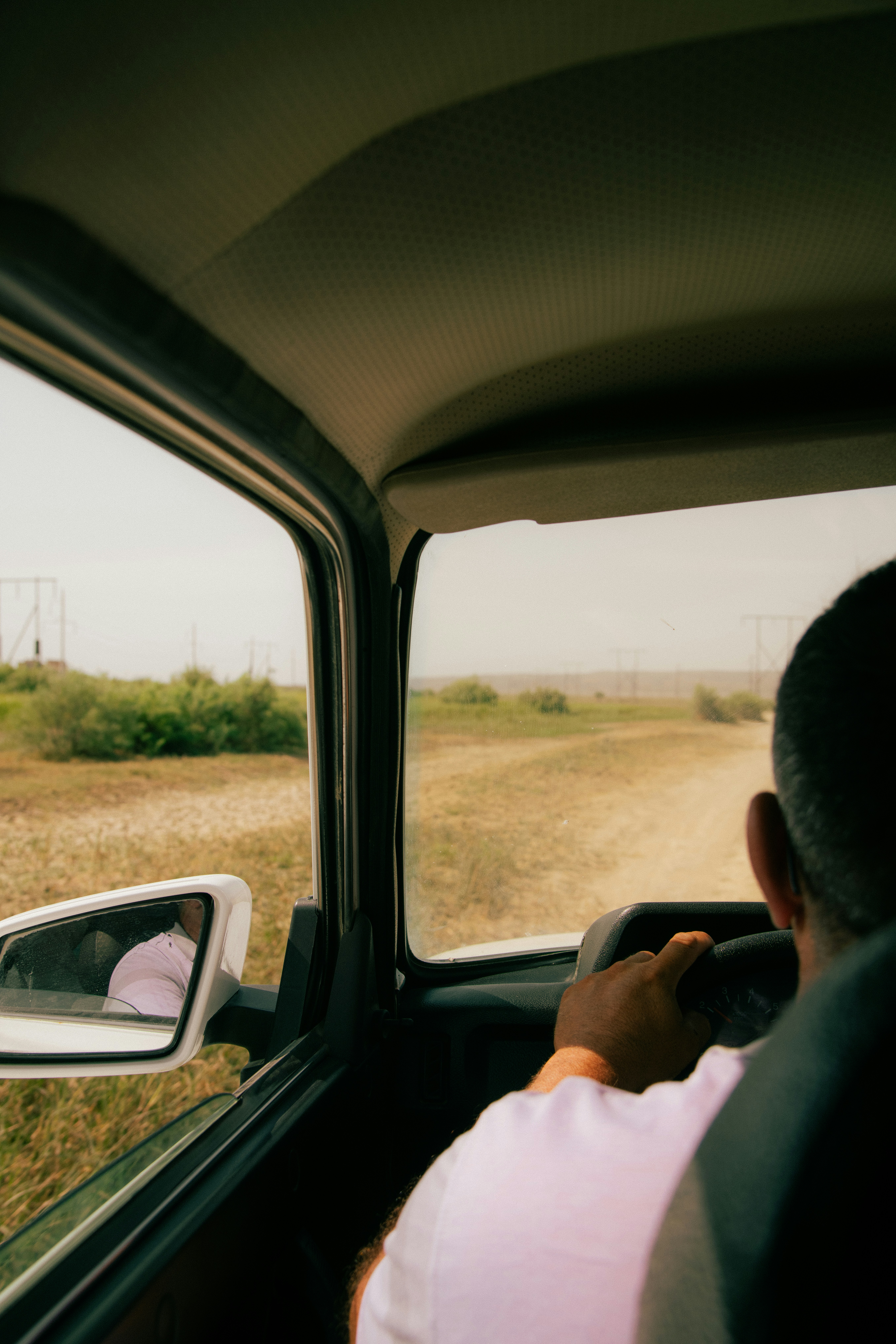 Driver's View: The Open Road Through a Vehicle Window