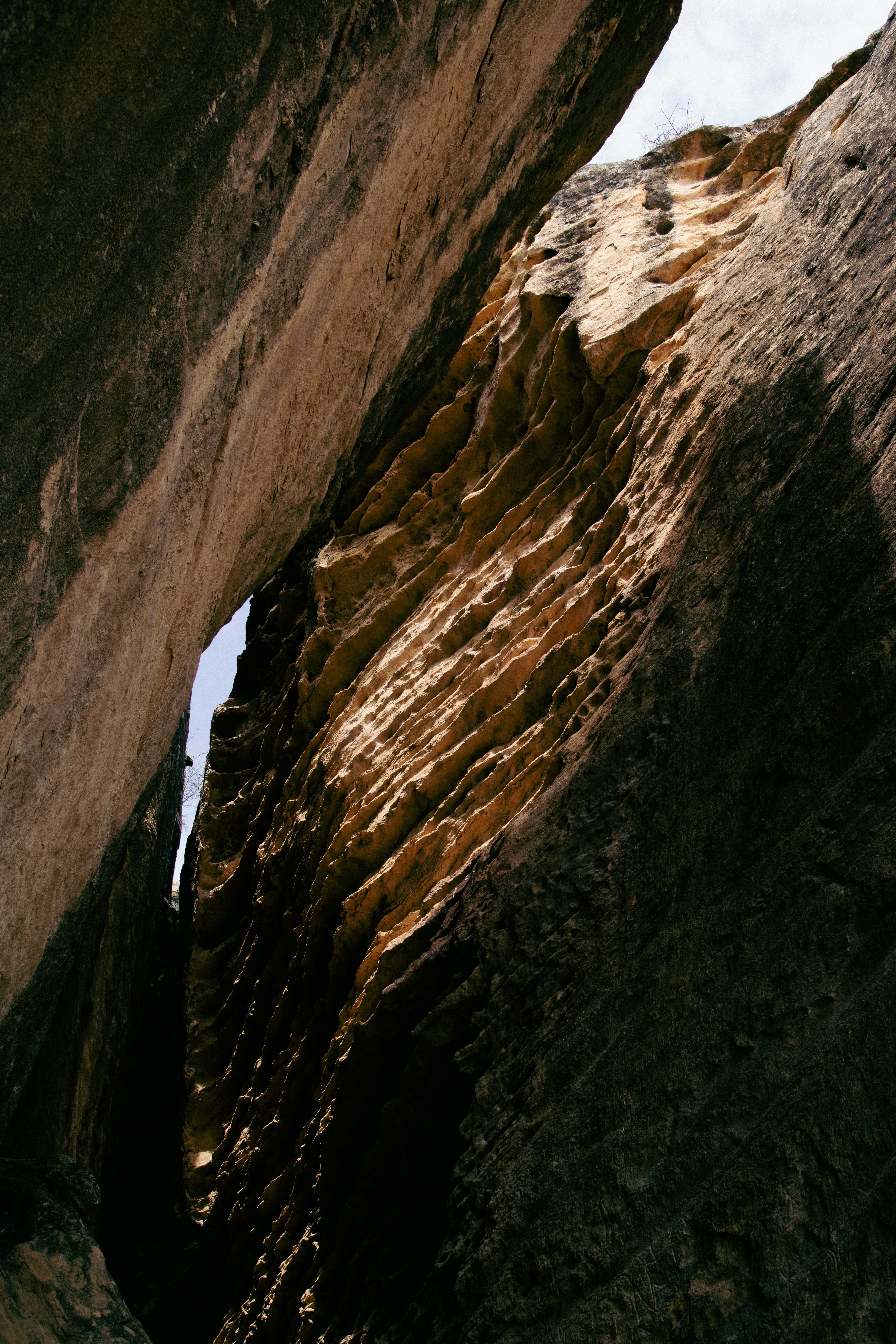 Skyline of Stone: A Narrow Canyon Snaking Between Weathered Walls