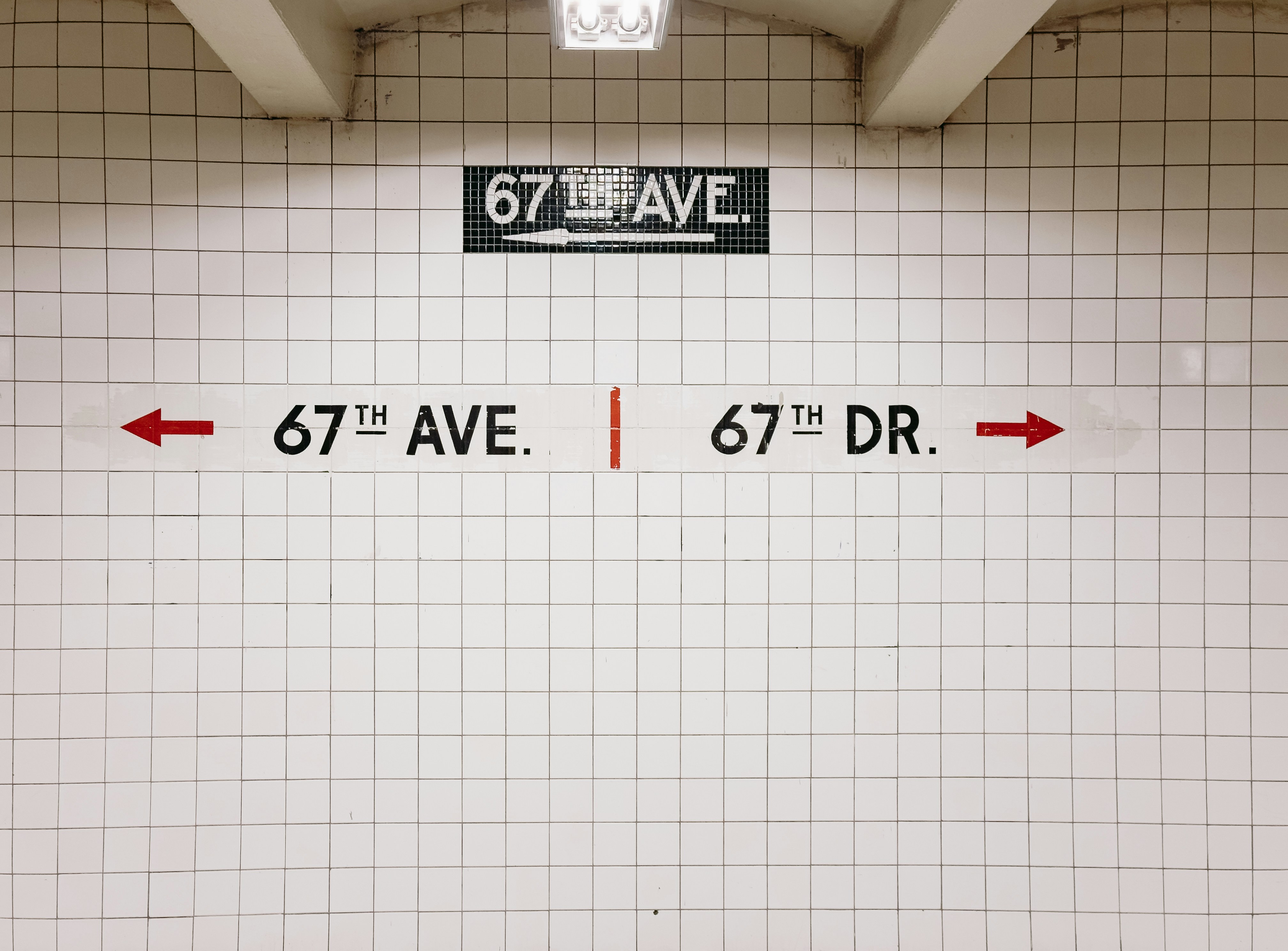 Midline of Tiles: A Subway Platform Signage Corridor