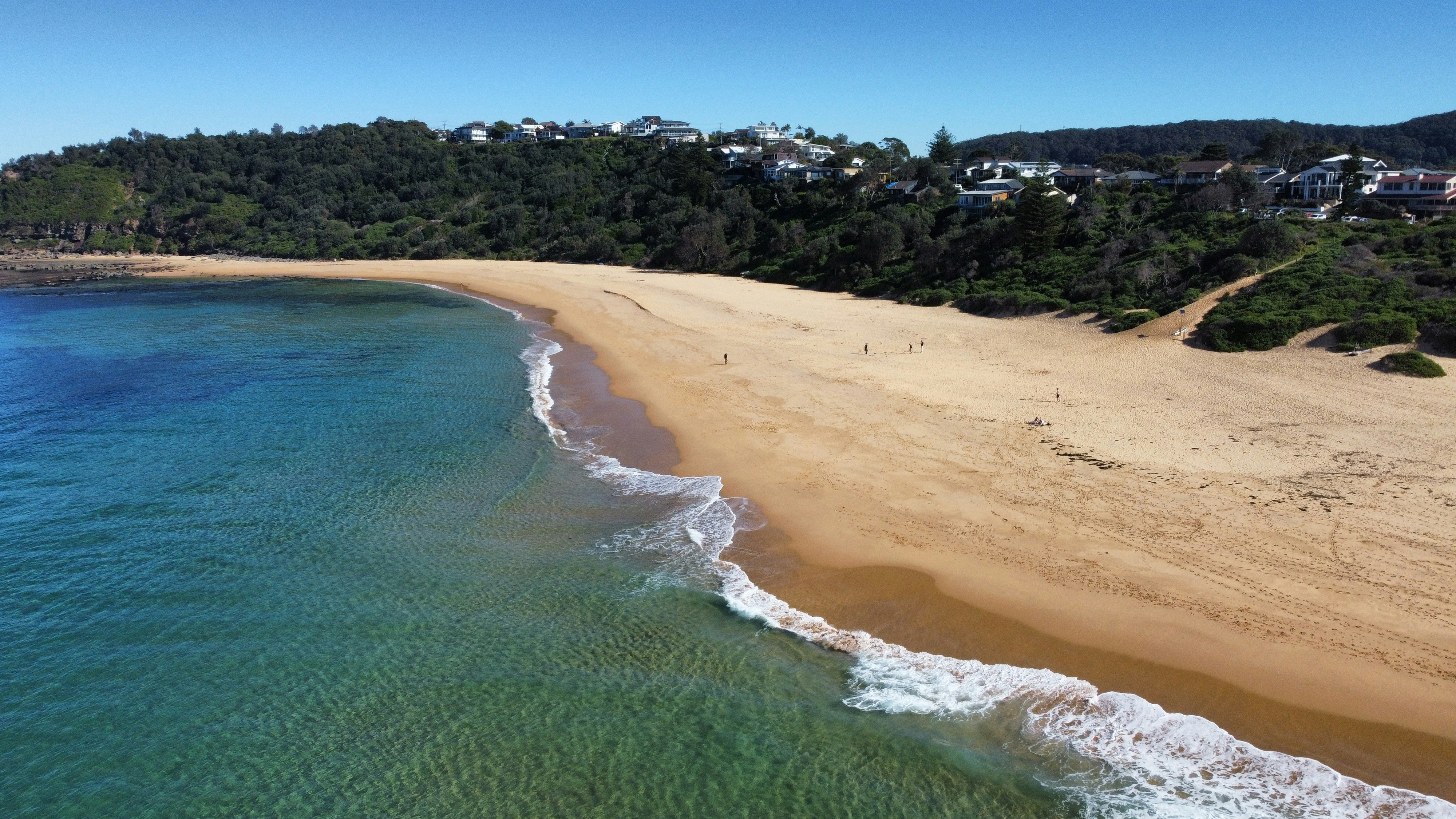Coastal Veranda: A Quiet Beach Embraced by Greenline Homes