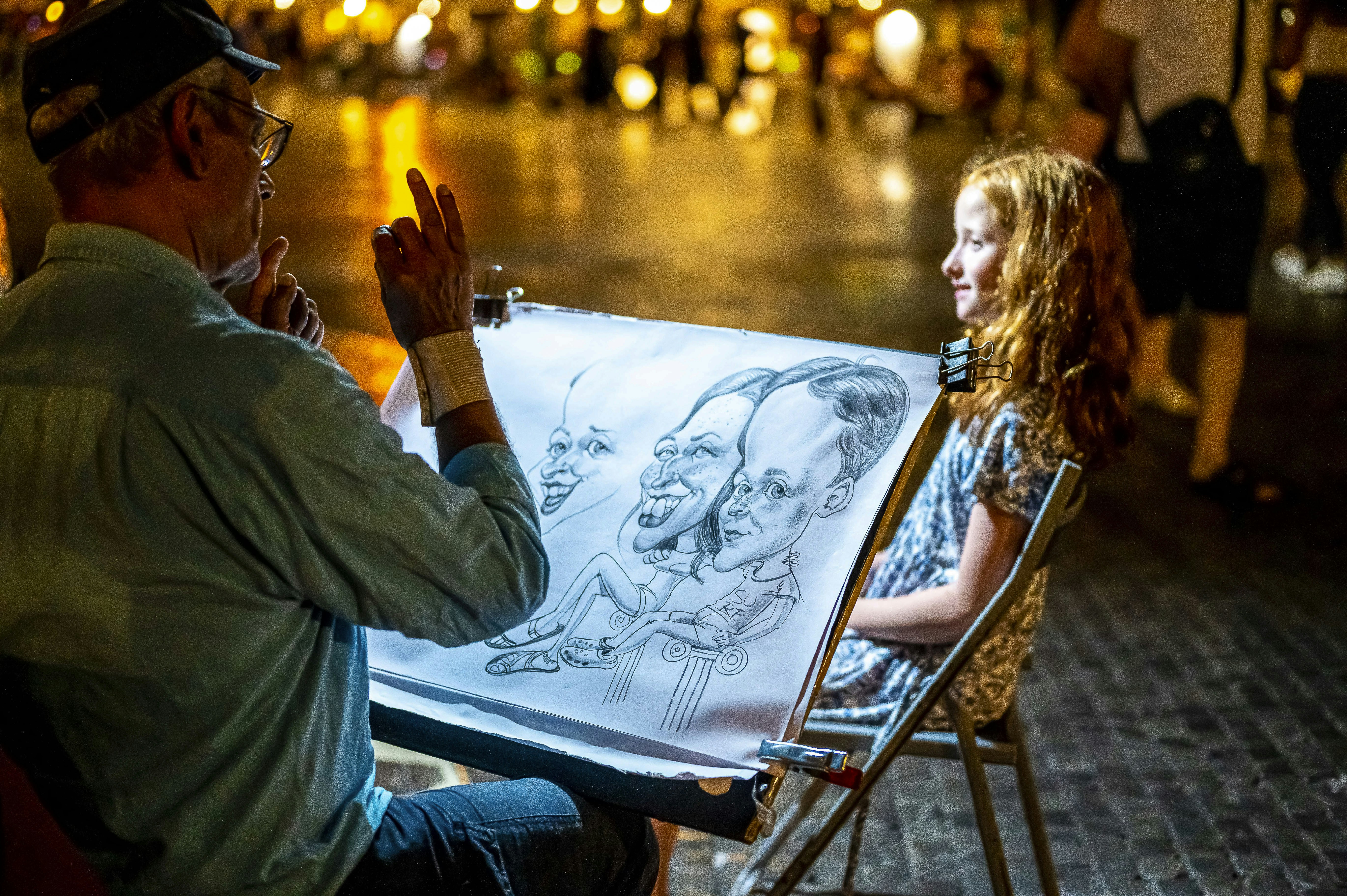 Caricatures in a Night Market: A Sketcher and His Muse
