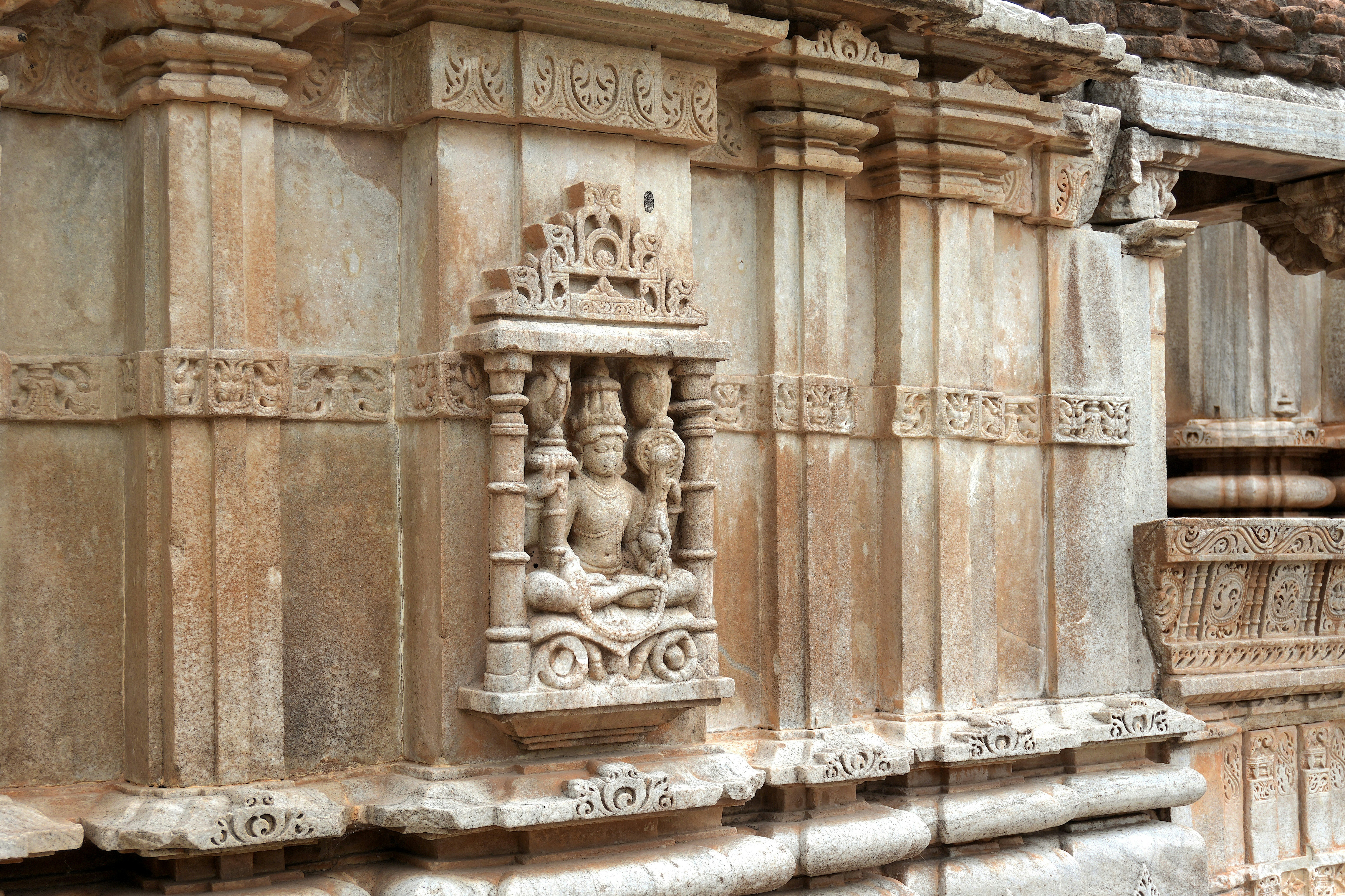 Stone Narratives: Carved Guardians on an Ancient Frieze