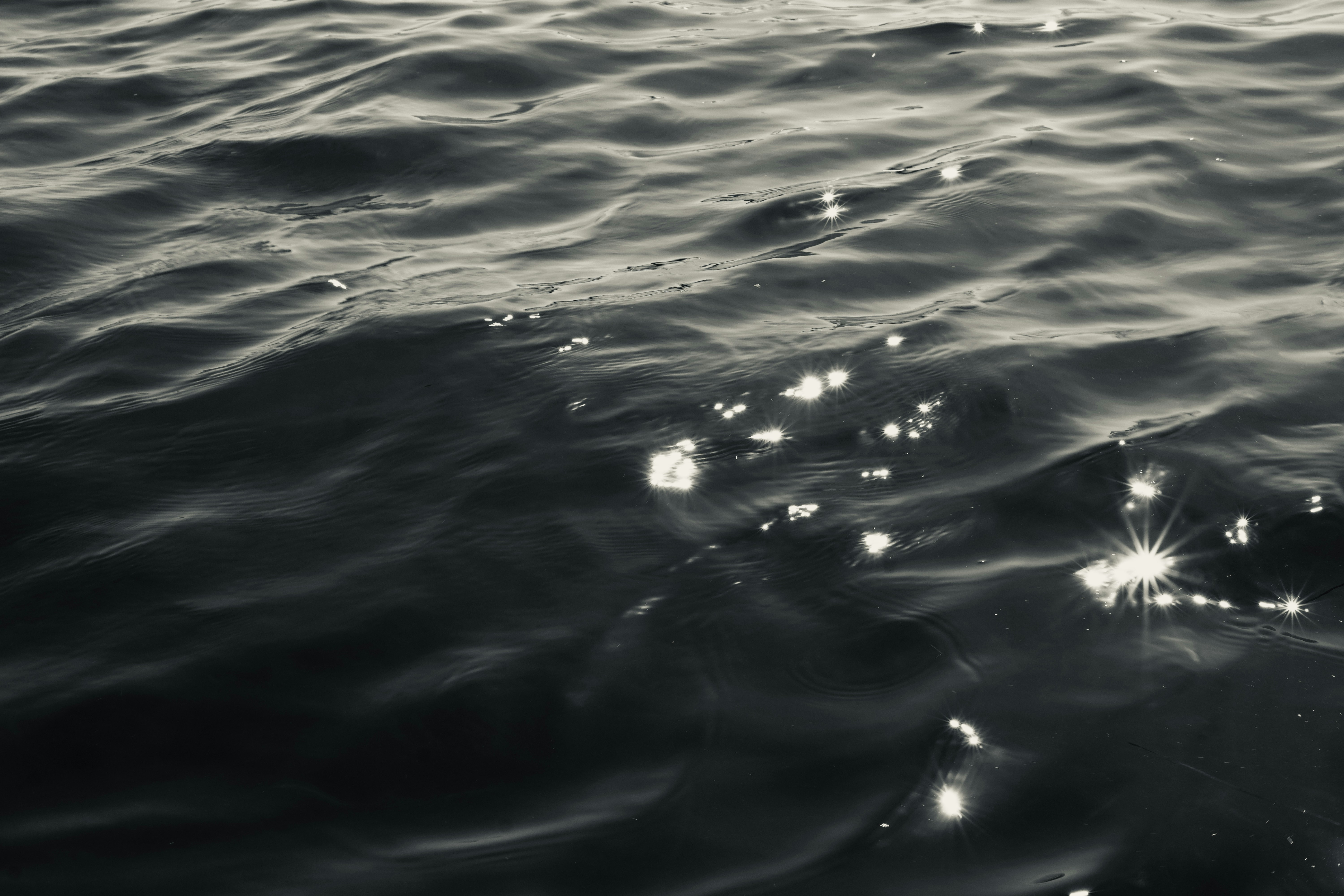 Moonlit Ripples: Sparkles on a Quiet Ocean
