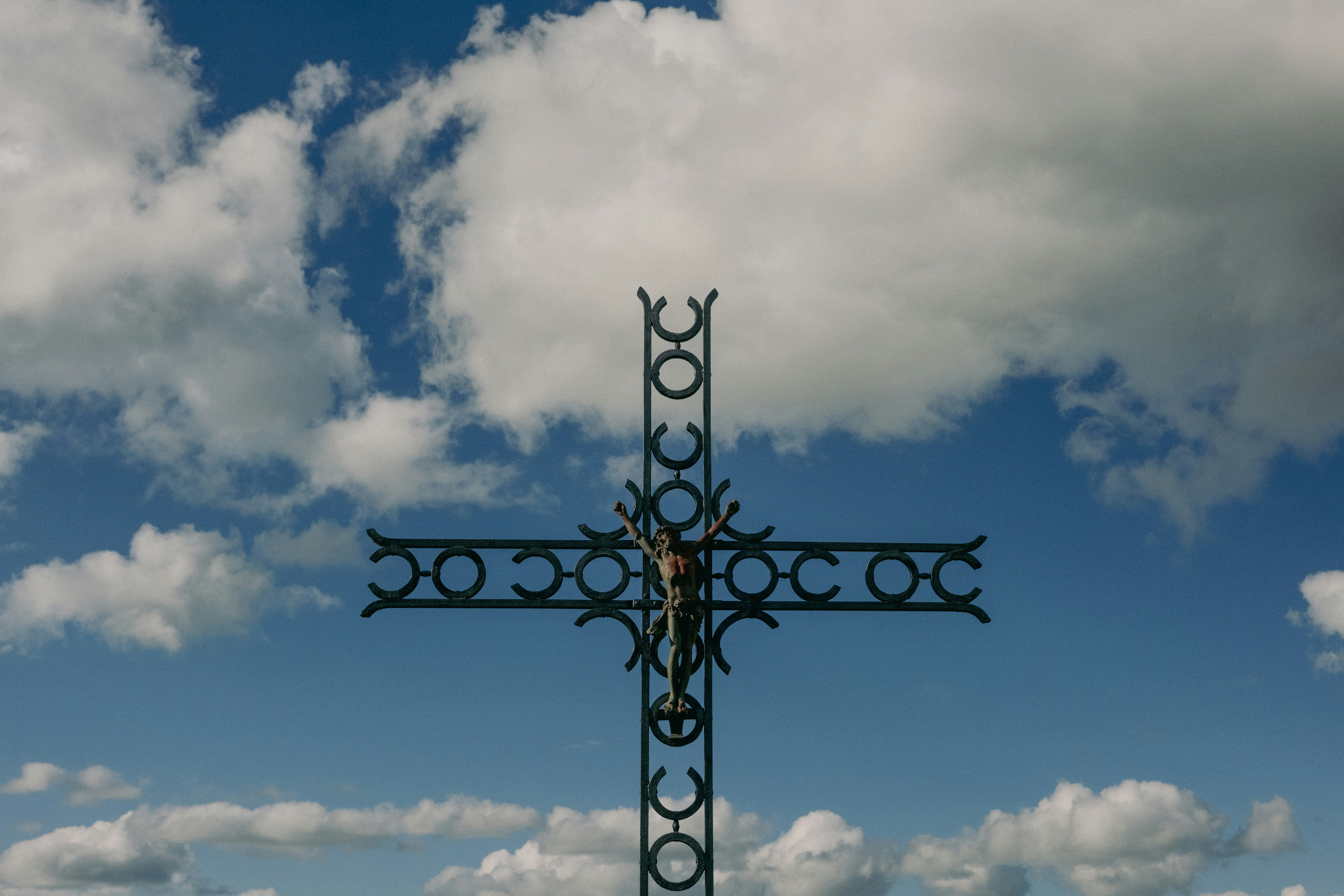 Cross Against a Sky Braid of Cirrus