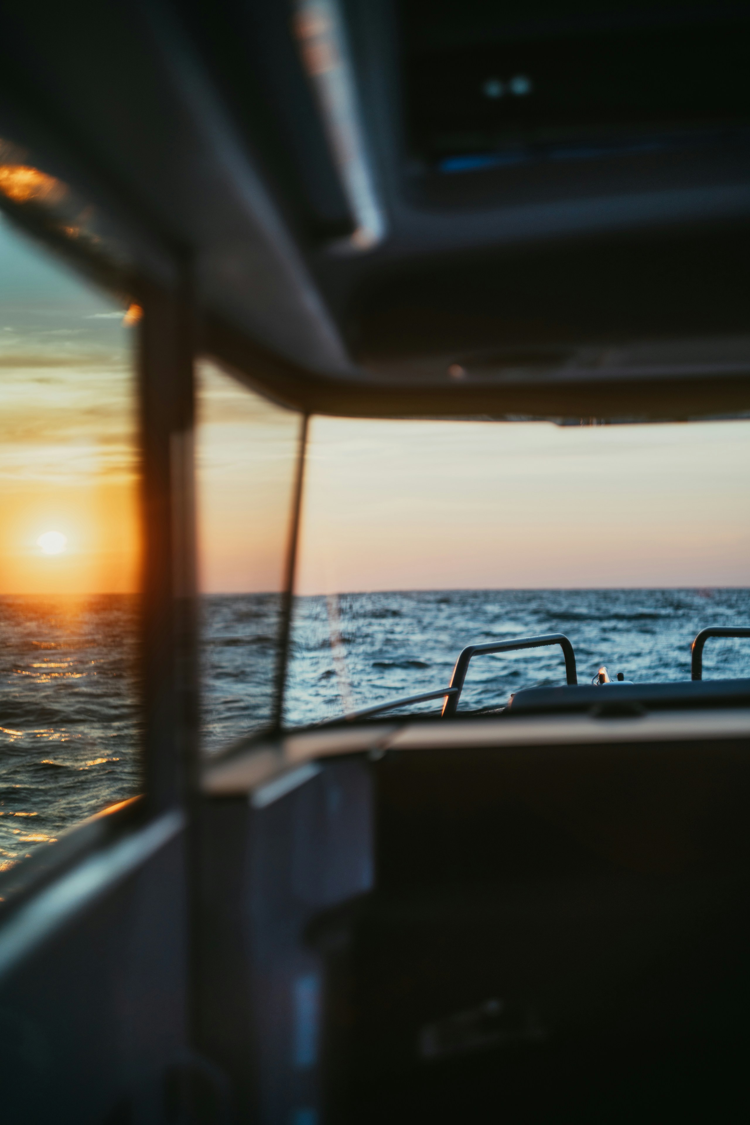 Sunrise at the Vessel: A First-Person View Through the Boat Cabin