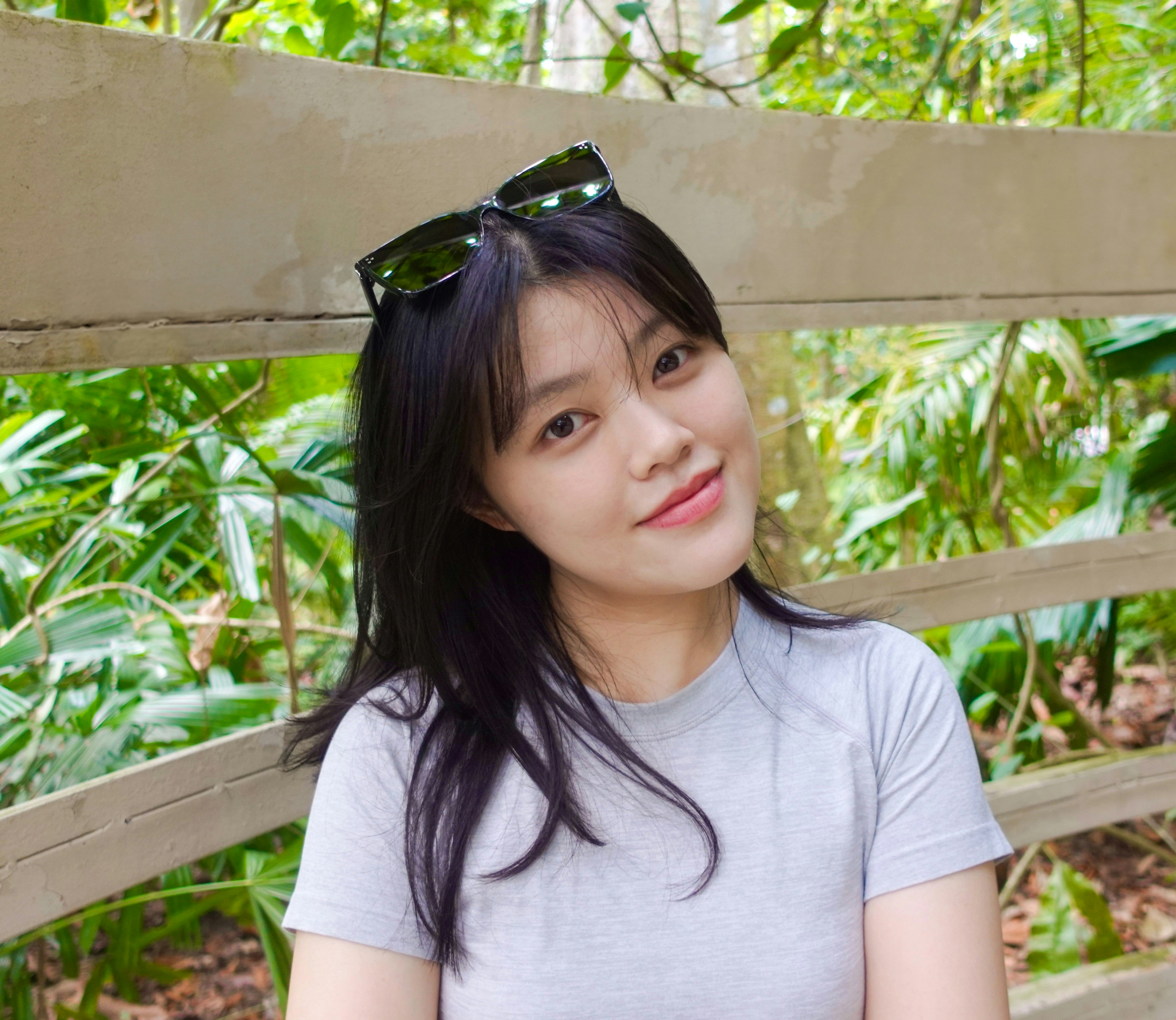 Soft Light, Quiet Smile: Portrait on the Garden Path