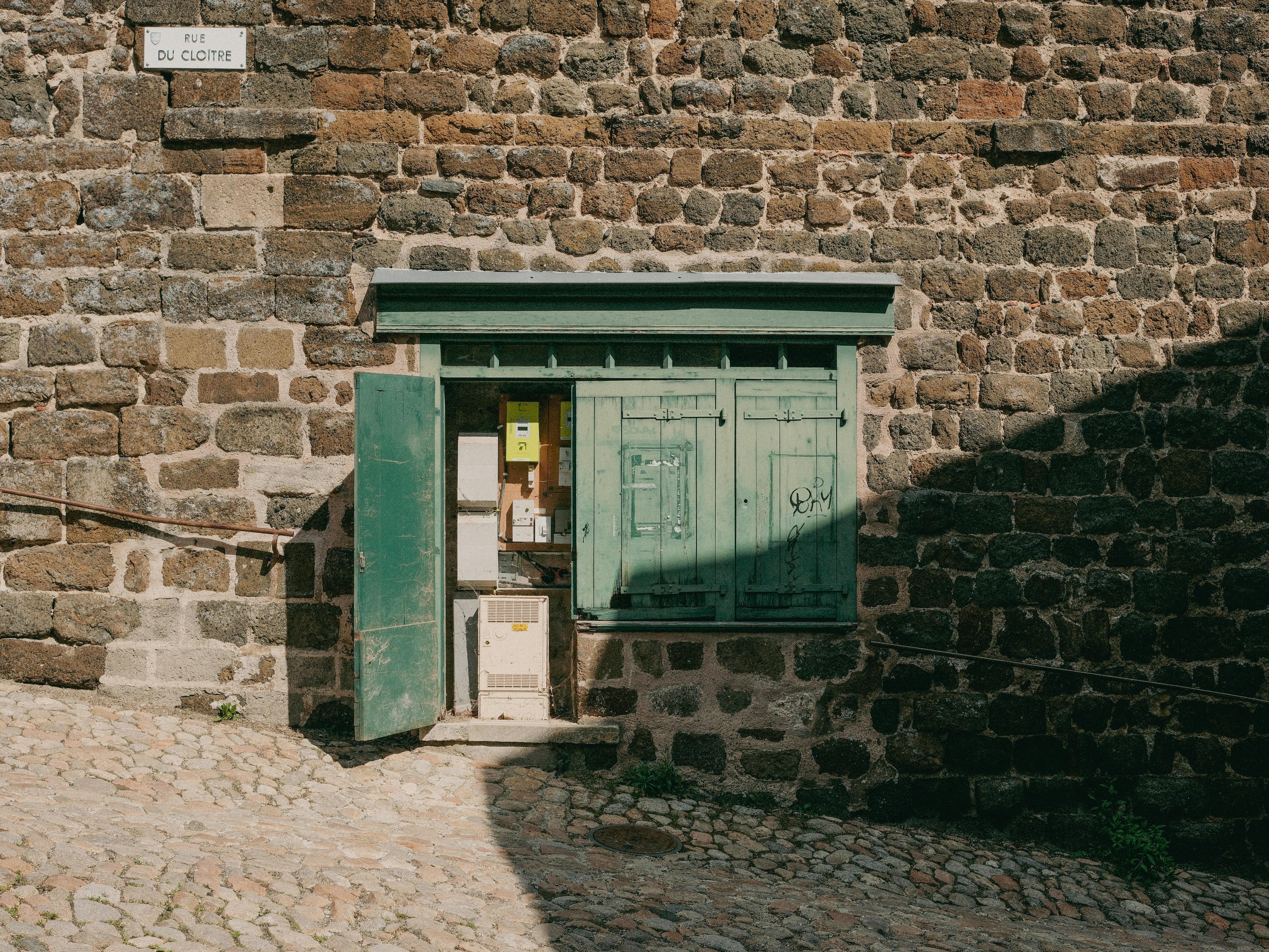 Green Doors and Shadowed Stone