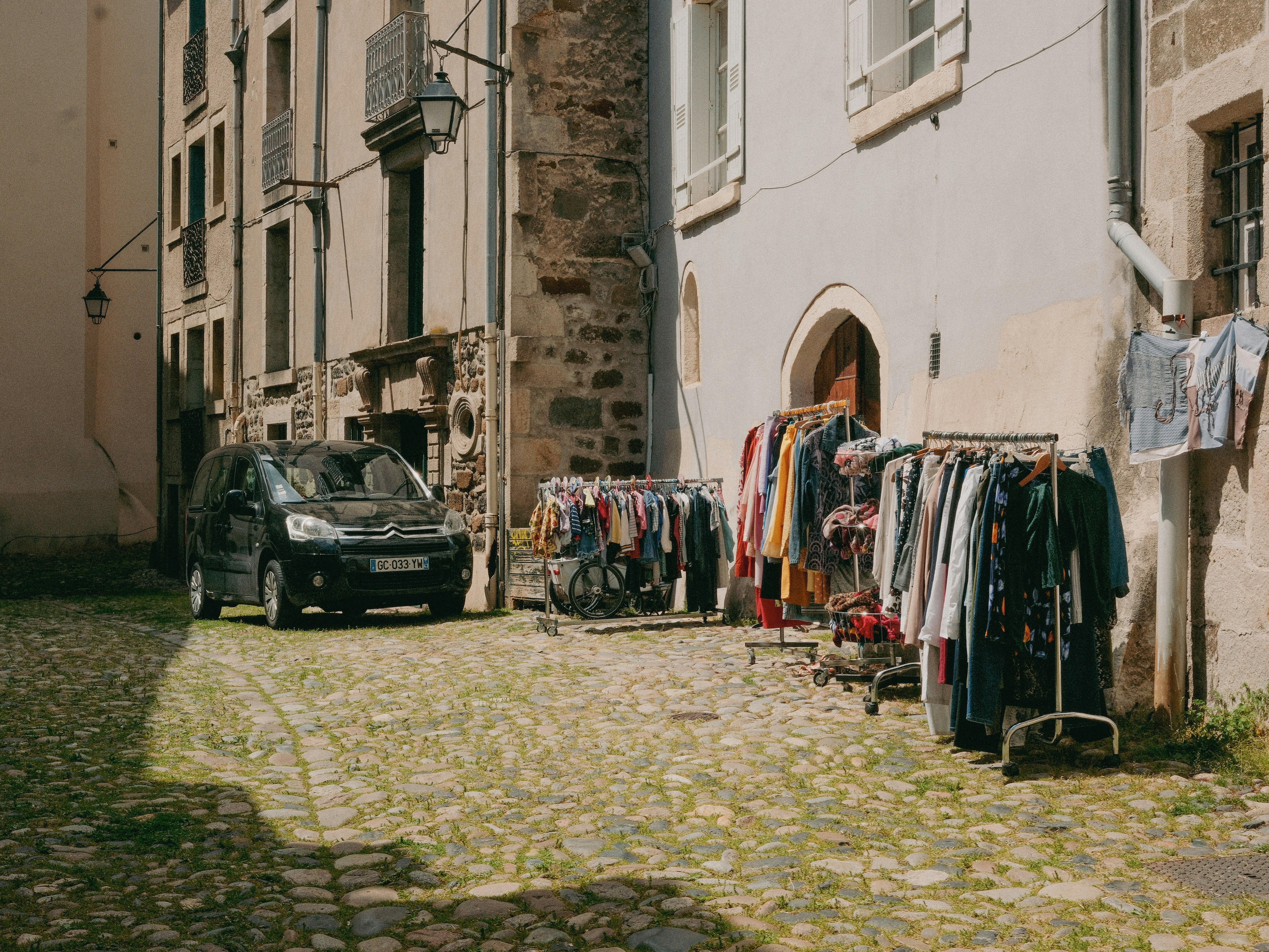 Cobblestone Lane Courtyard with Market Rails