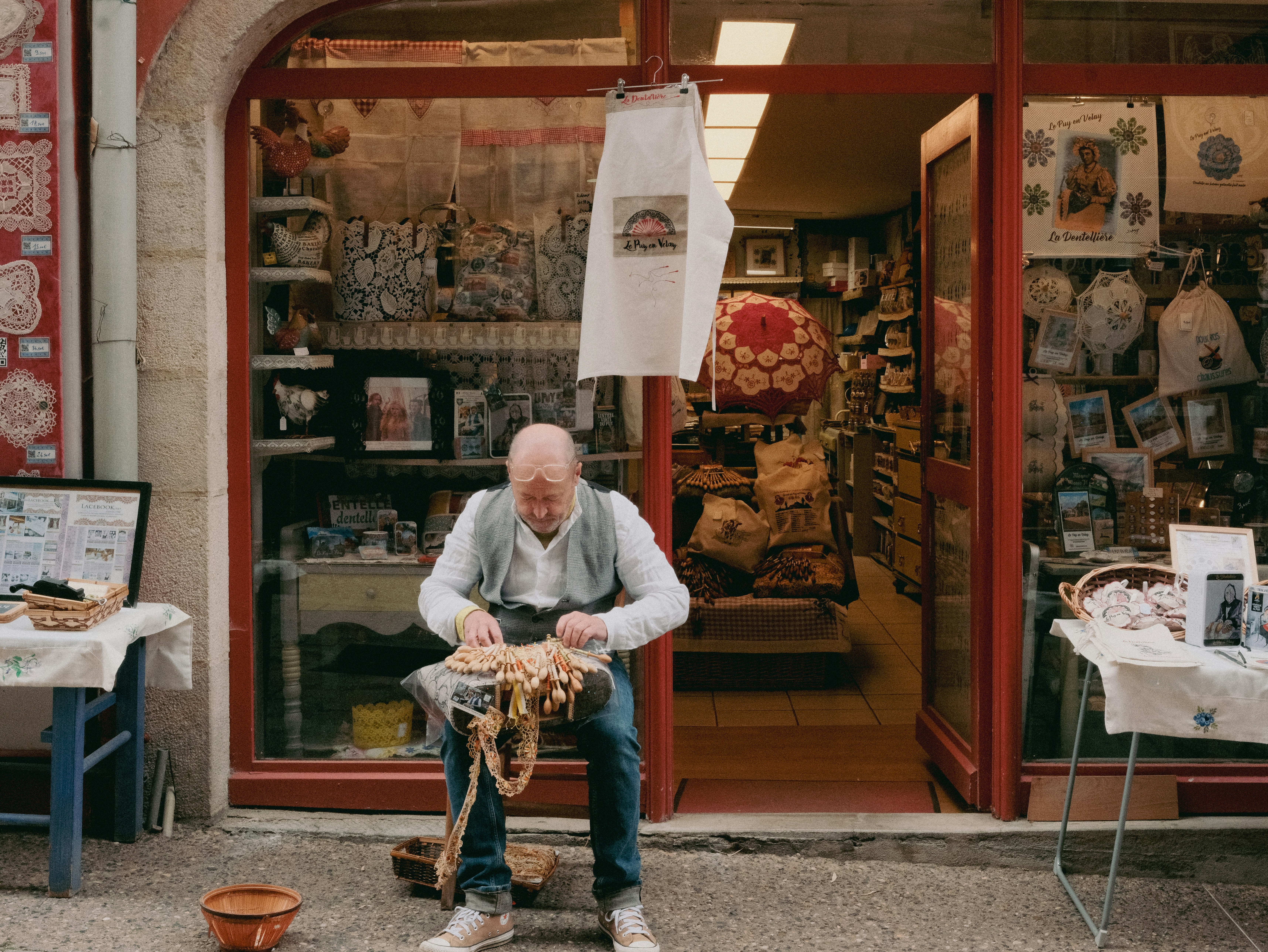 An Elderly Man Brews Craft in a Quaint Shopfront