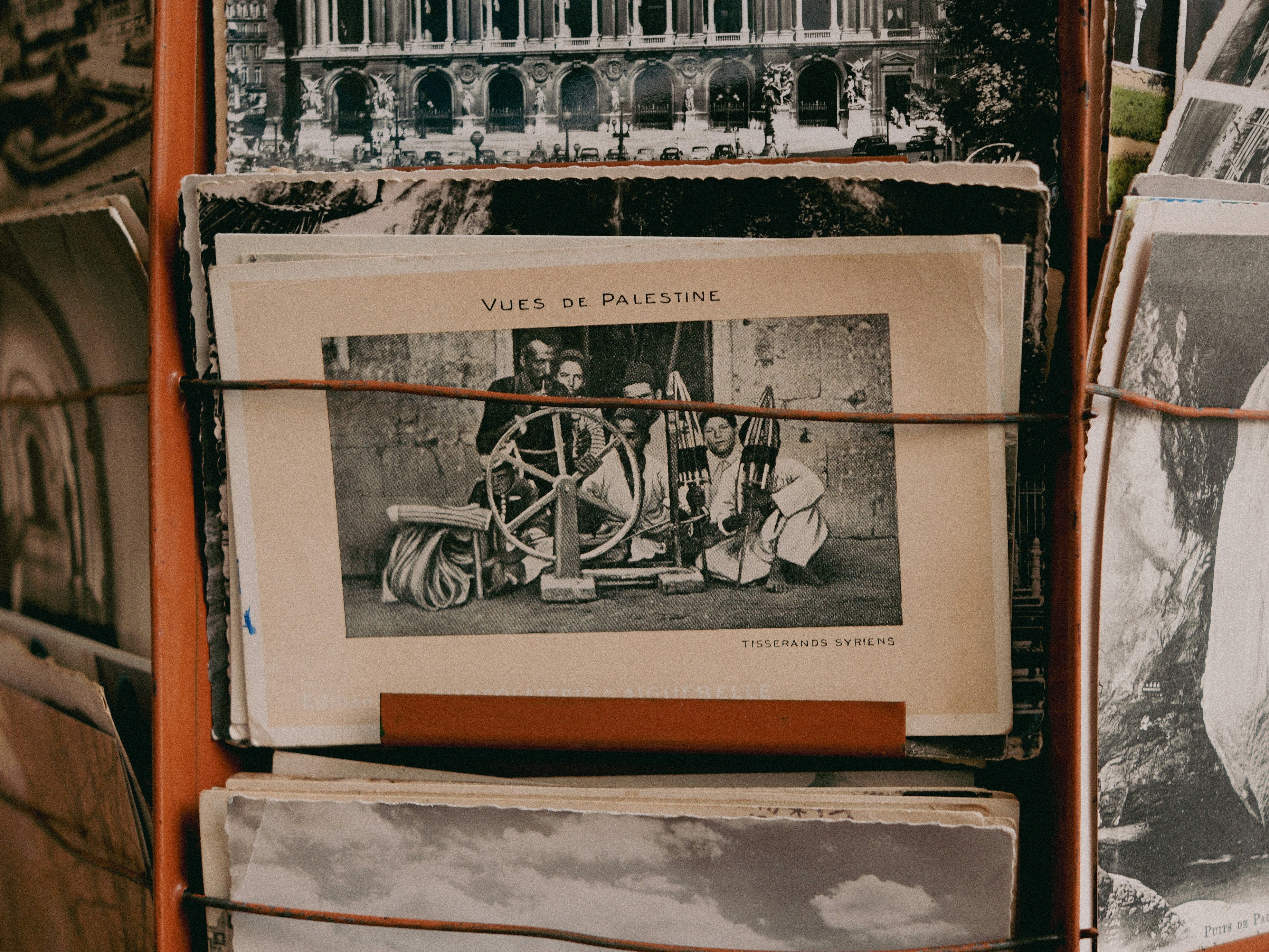 Old-World Vinyl Nook: Records Lean Against a Wire Rack
