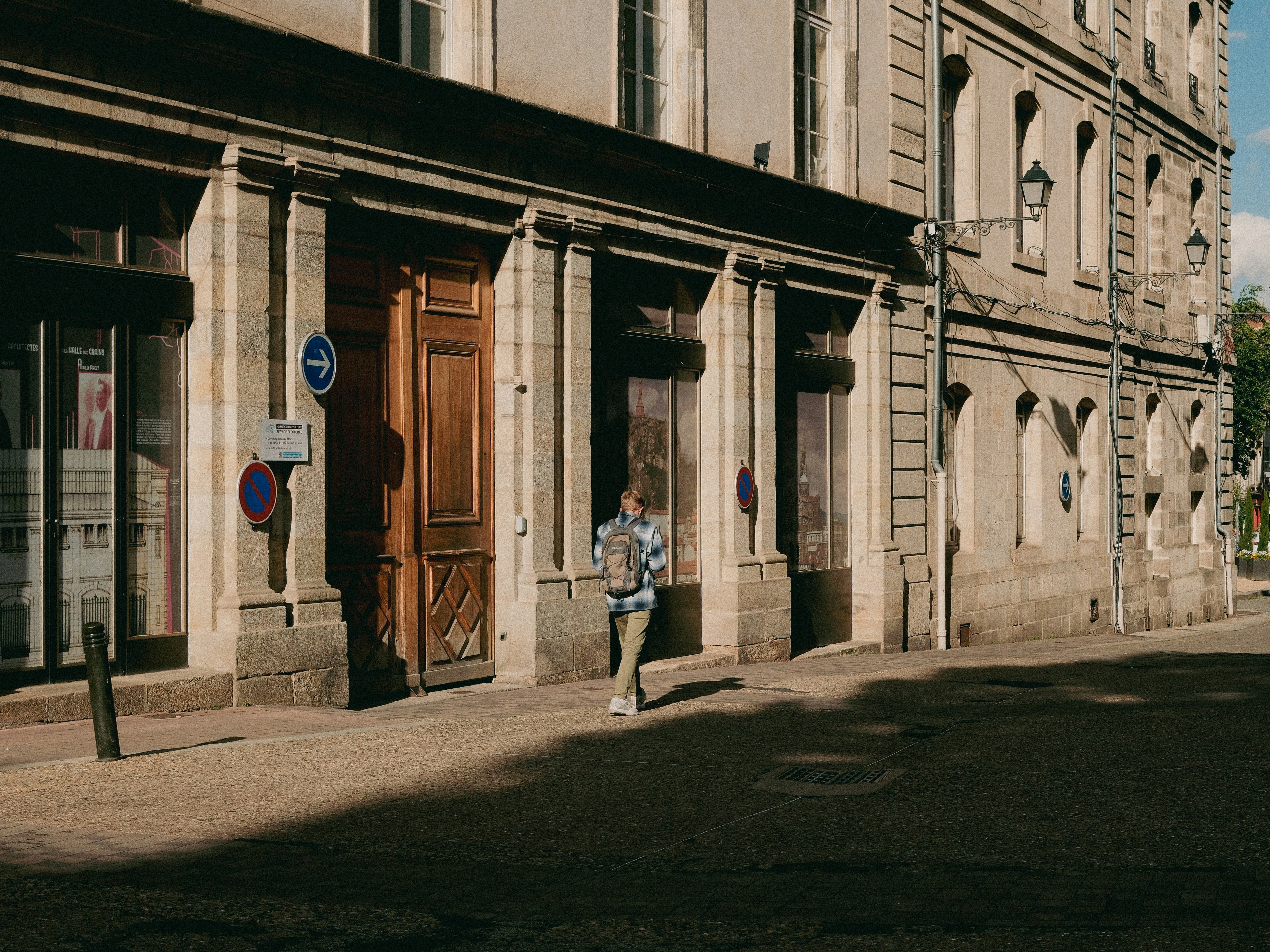 Footsteps in the Sunlit Street