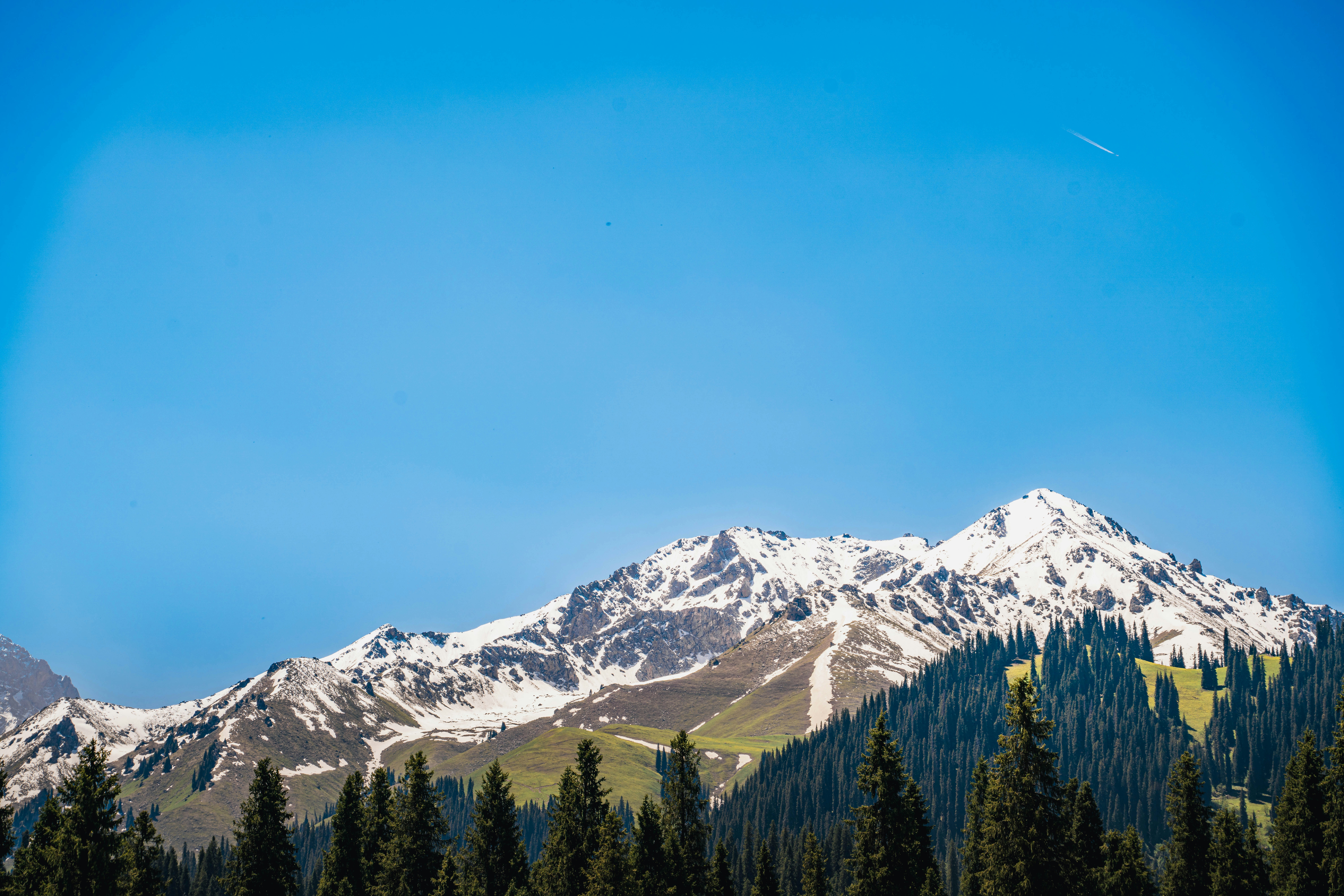 Snow-kissed Peaks Under a Cerulean Sky