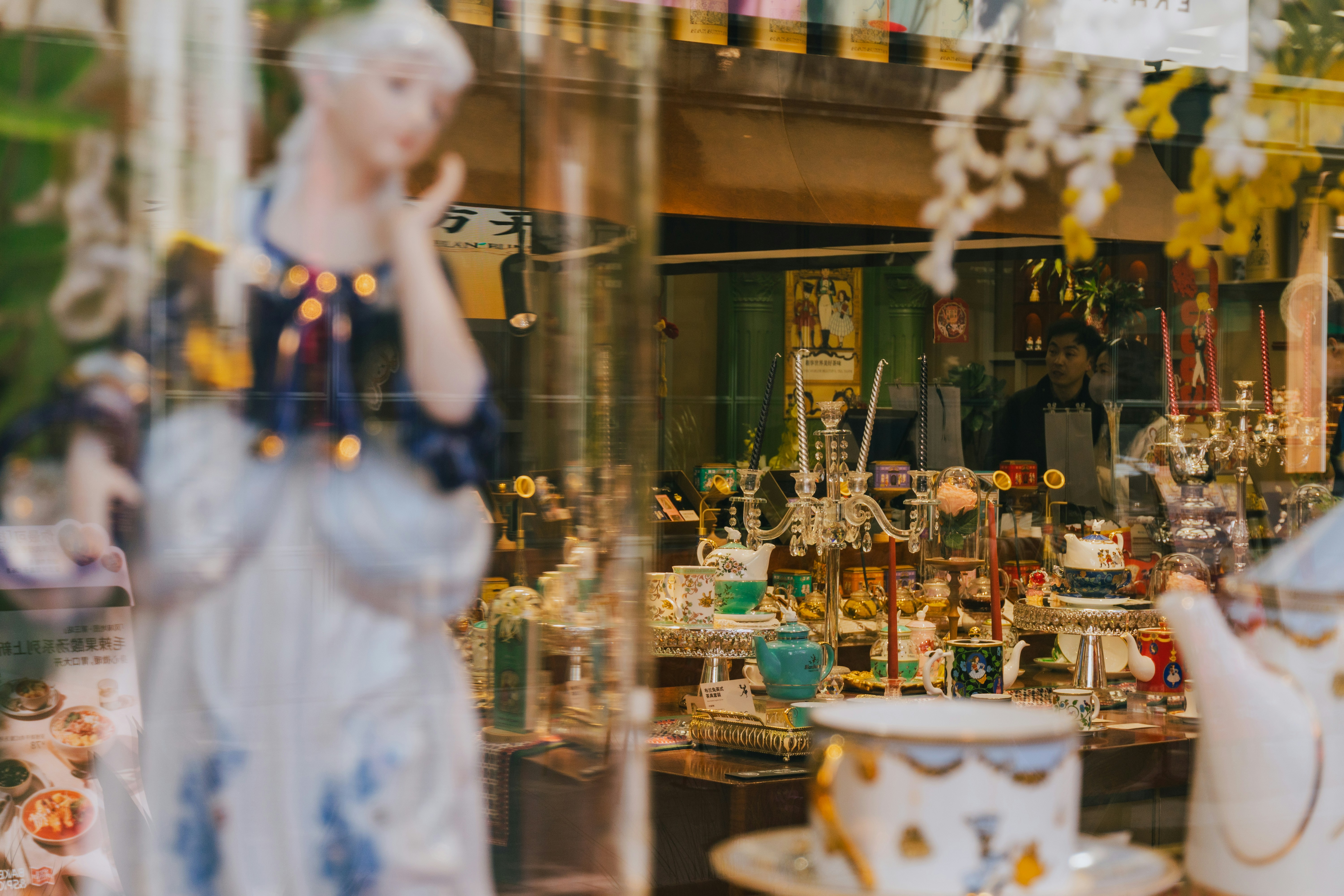 Cloudy Window, Gleaming Trinkets: A Storefront through Glass