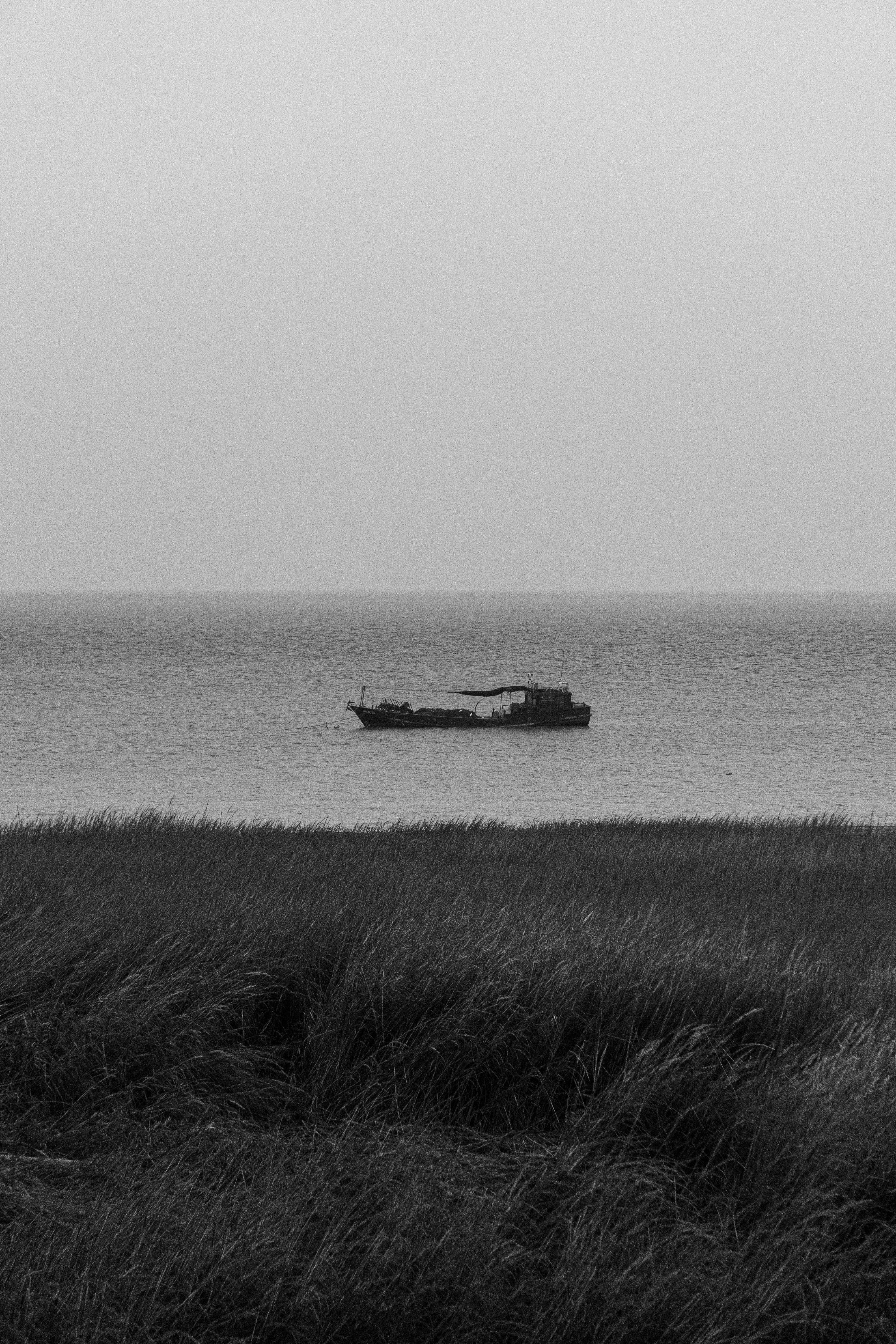 Harbor Vessel on a Quiet Horizon