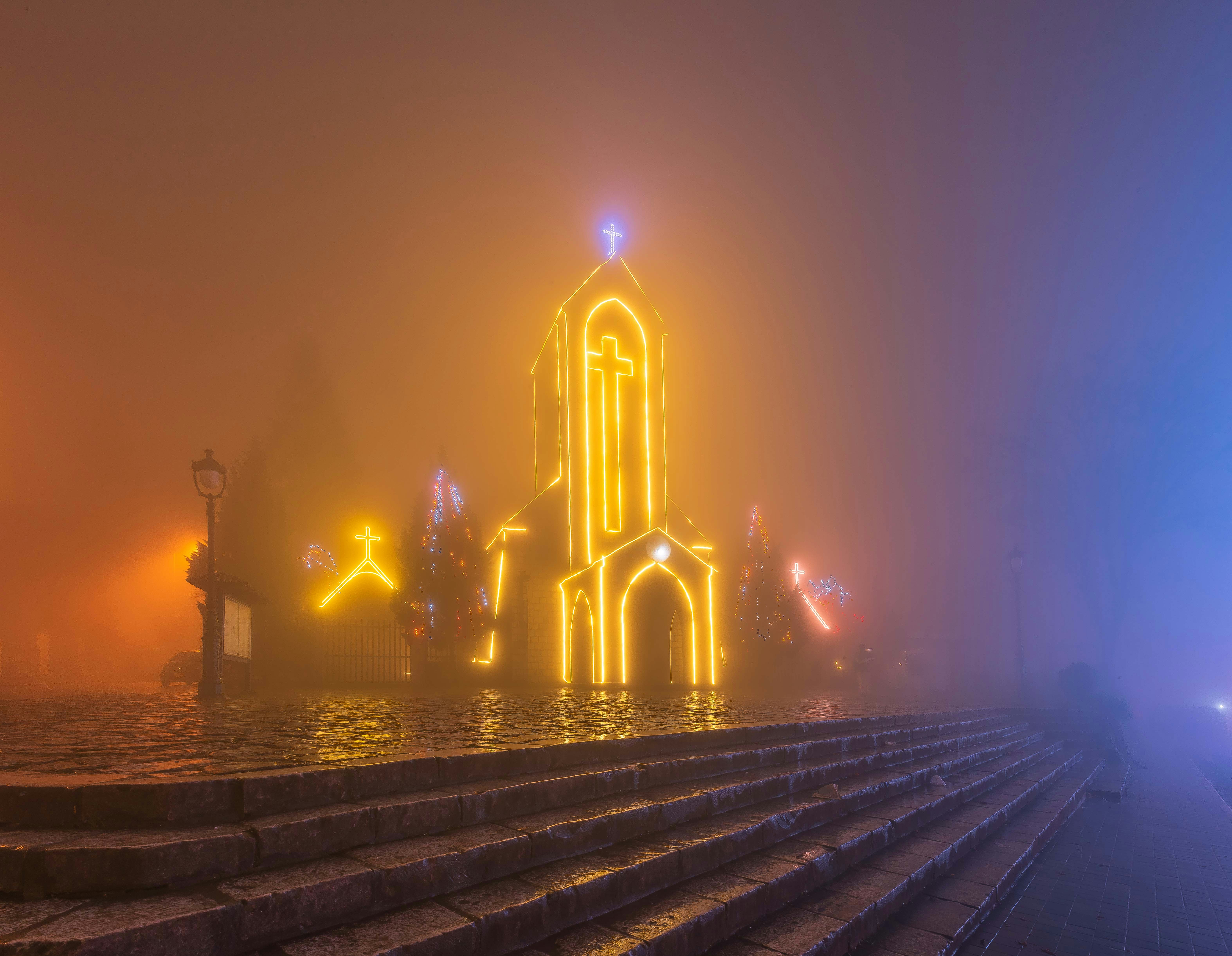 Neon Chapel in the Mist: A Fog-Softened Night at the Steps
