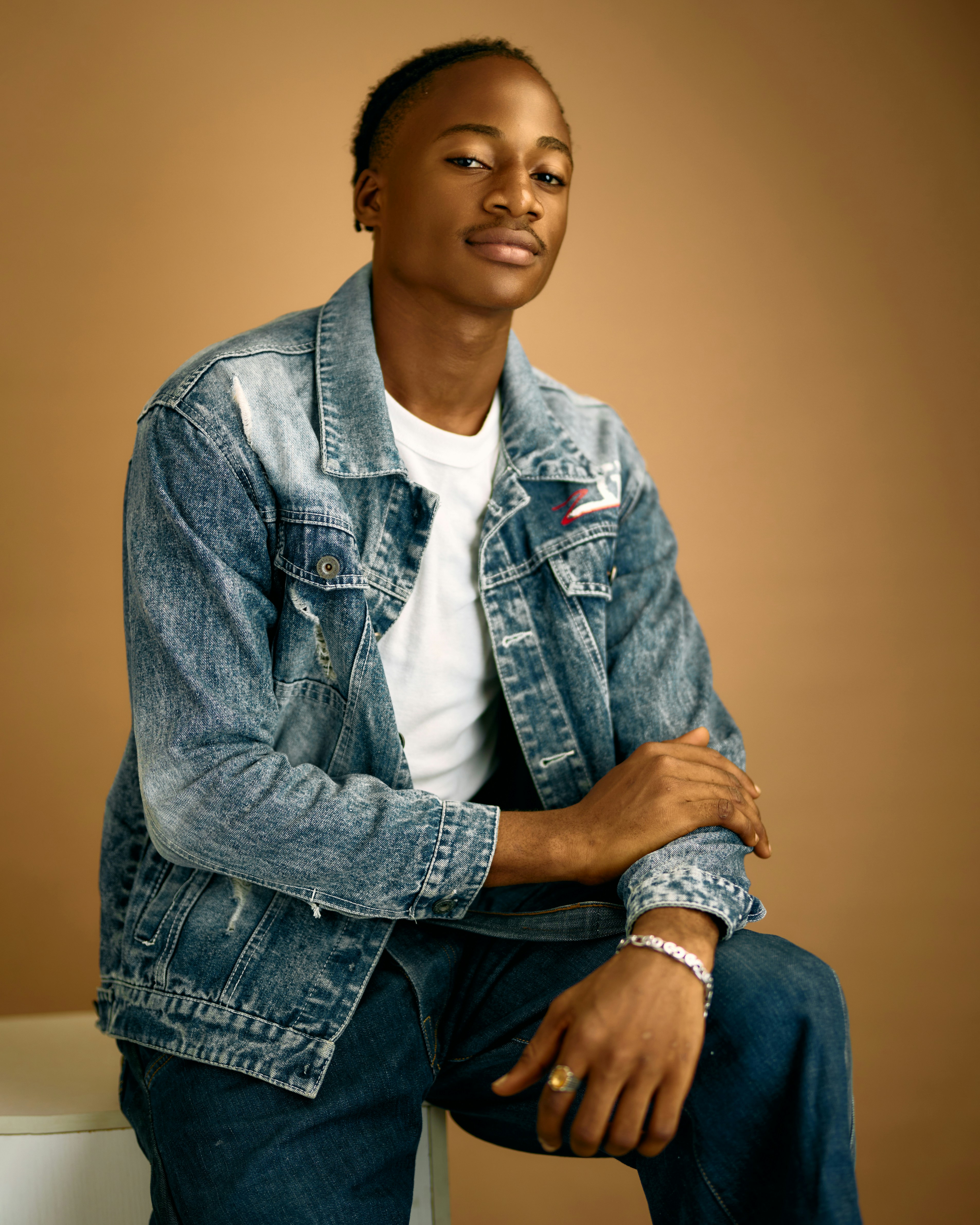 Casual Confidence: Youthful Portrait in a Denim Moment