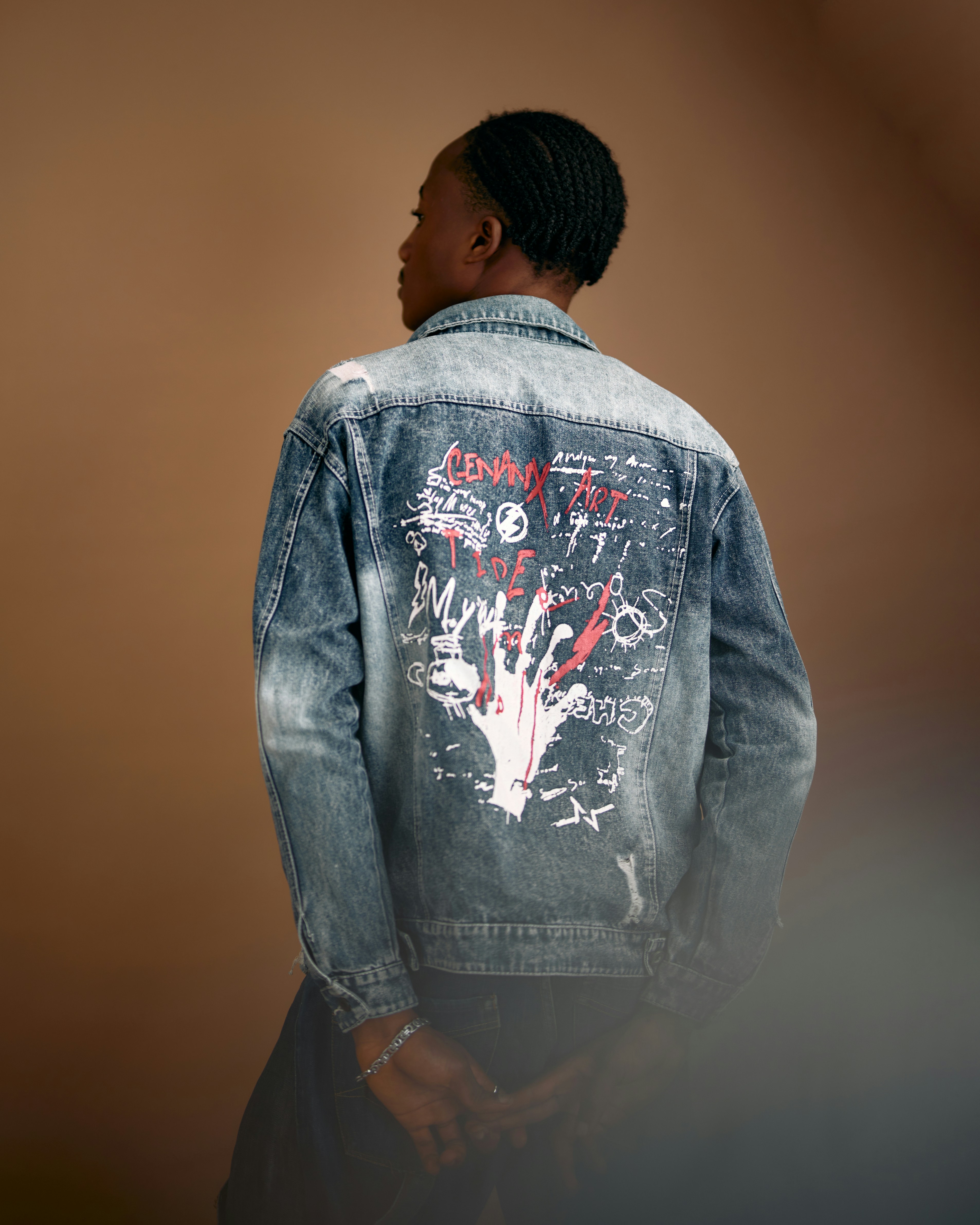 Back Turned, Painted Denim: A Portrait in Texture and Graffiti Embellishments